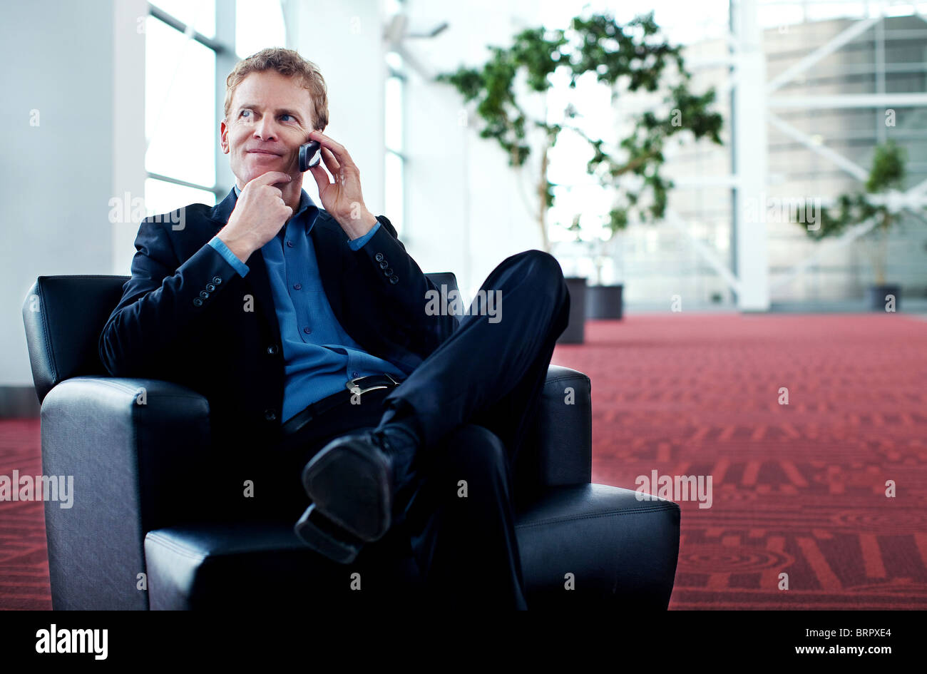 Male Baby Boomer wireless Business travel Stock Photo - Alamy