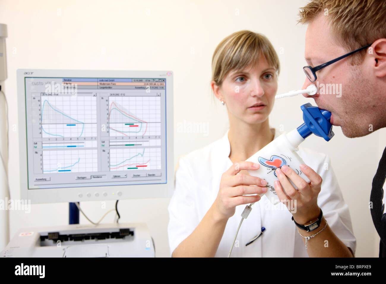 Medical practice, lung function test, volume test Stock Photo - Alamy