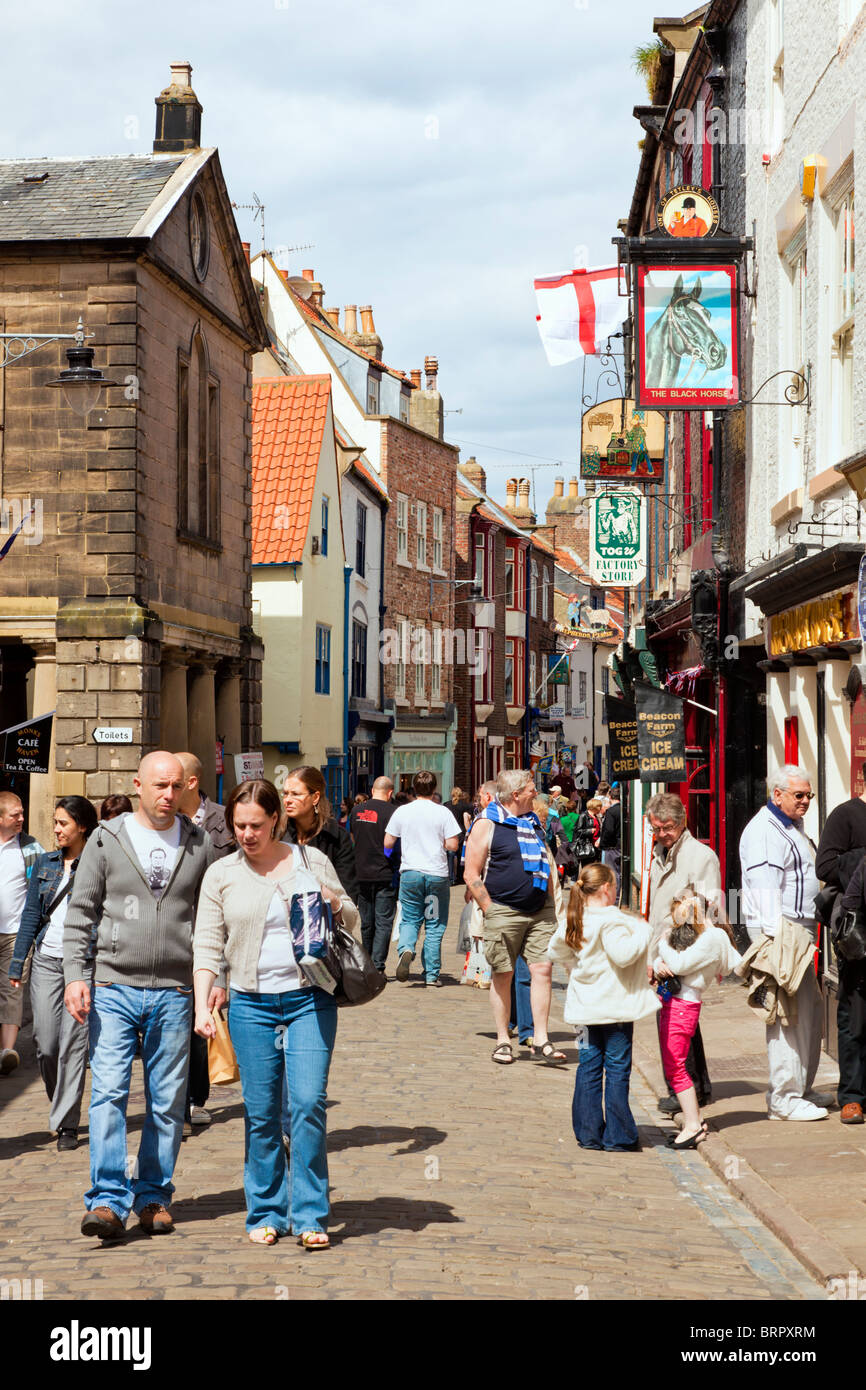 Whitby, UK - Shoppers in the old busy streets, North Yorkshire, England ...