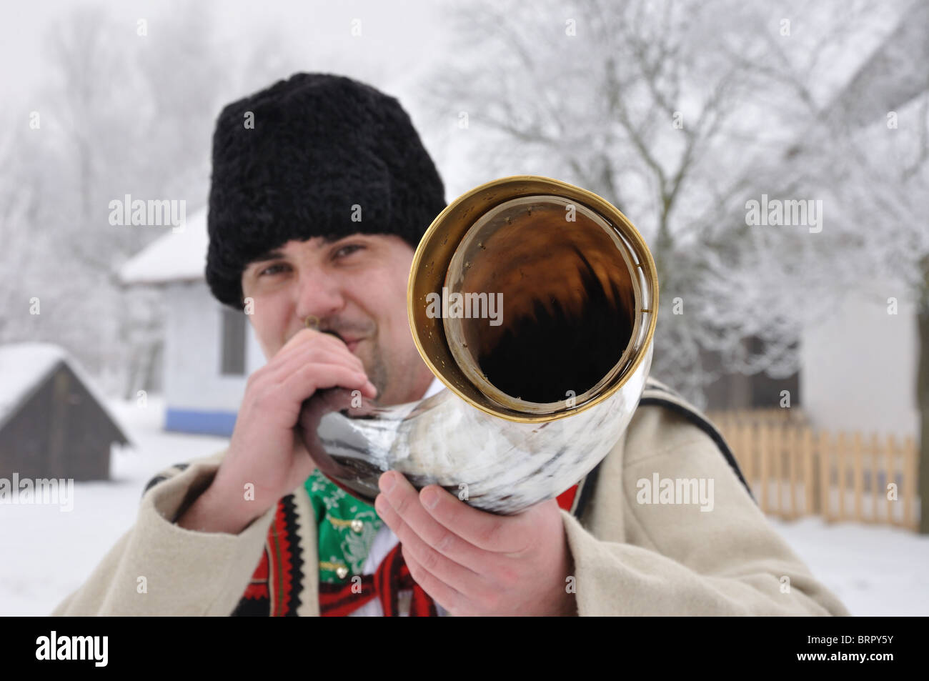 Night watcher blow at Christmas time Stock Photo - Alamy