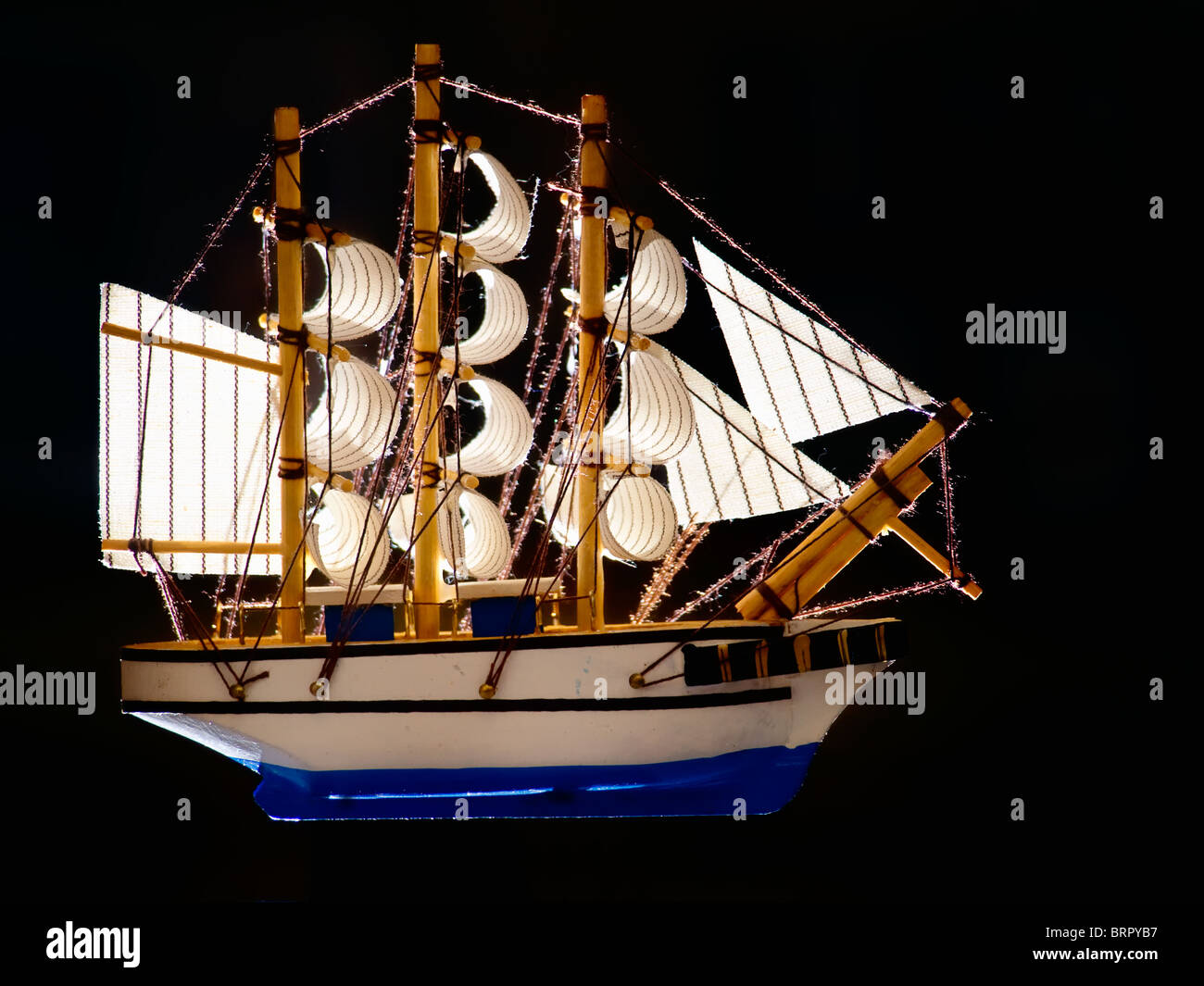 Sail ship model isolated on a white background Stock Photo - Alamy