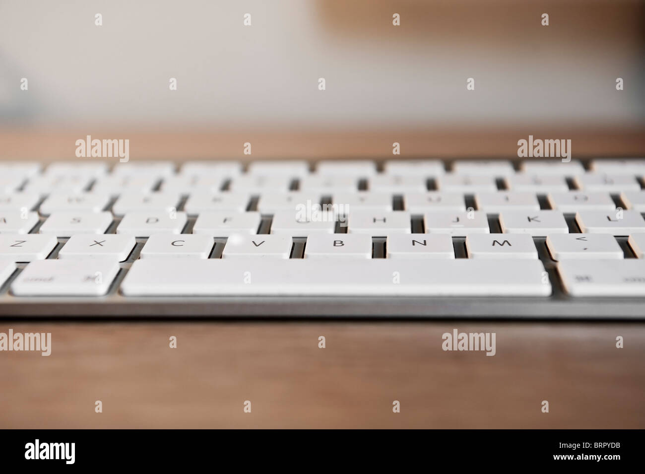 Computer keyboard close up on office desk. Apple Mac Stock Photo - Alamy