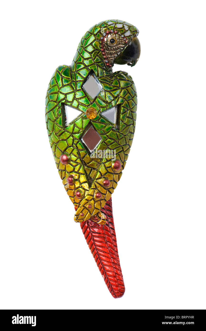 object on white - parrot magnet close up Stock Photo - Alamy