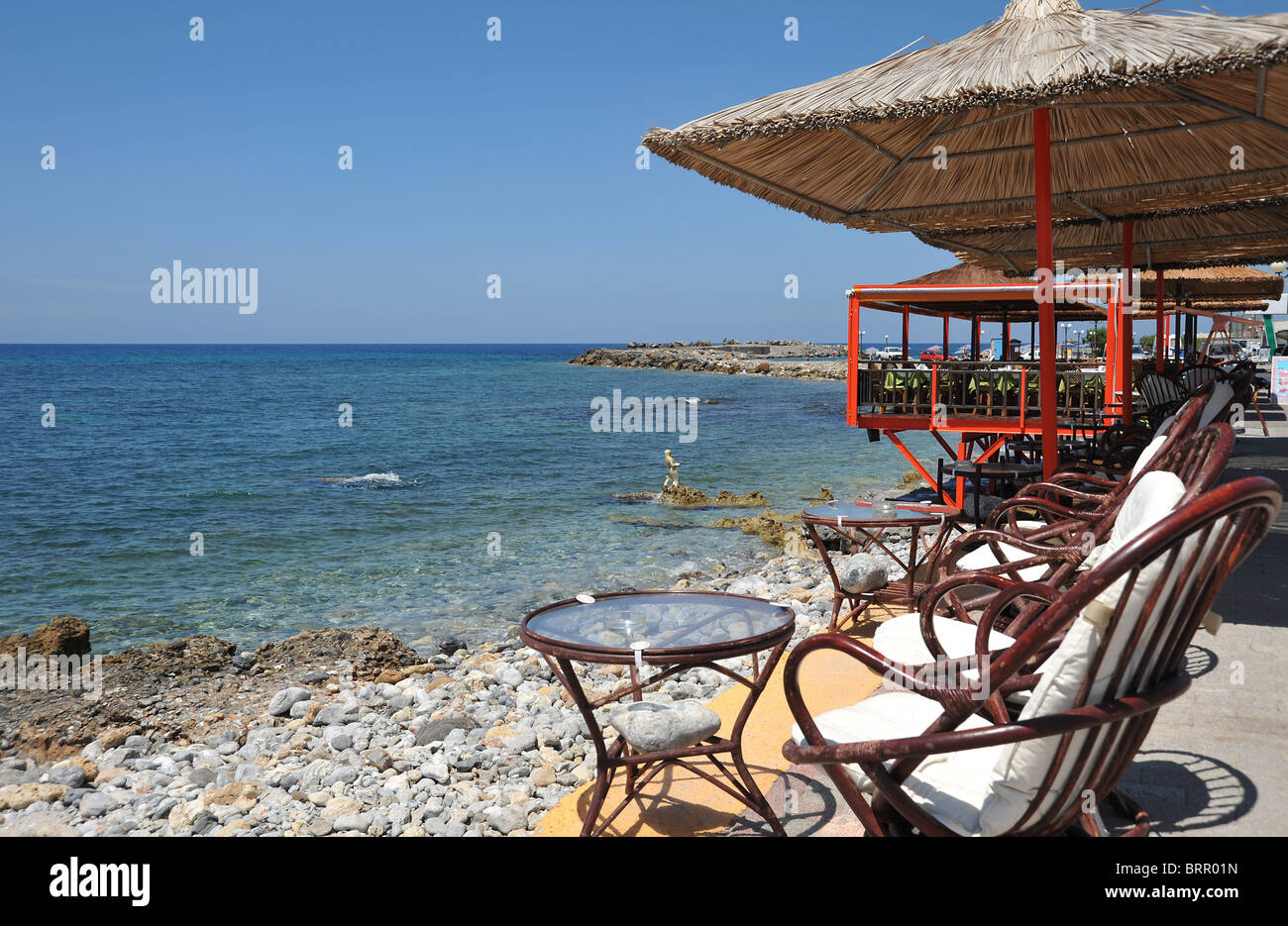 Restaurant overlooking the sea at Gouves, Crete, Greece Stock Photo - Alamy
