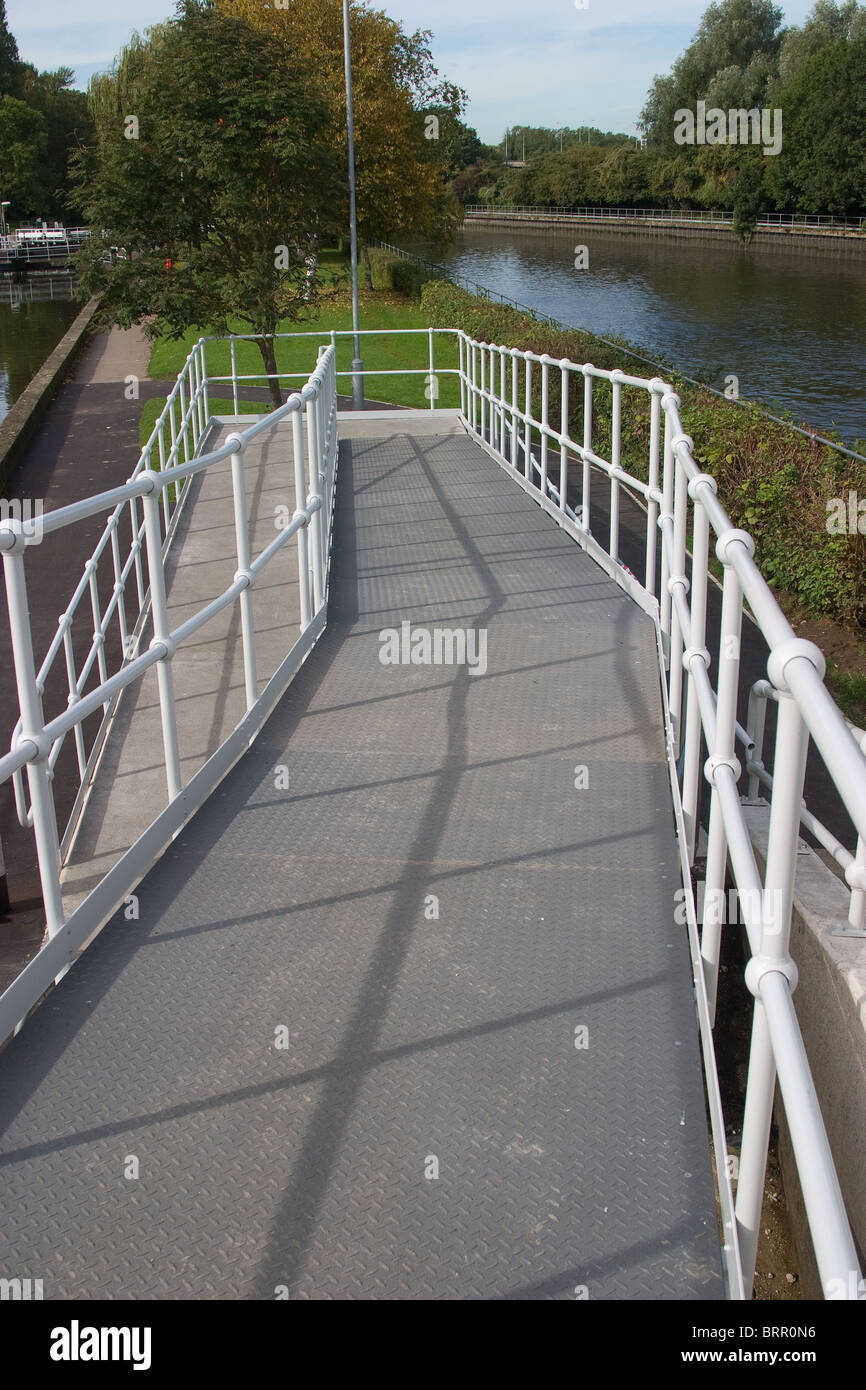 disabled cyclist access river crossing fence rail Stock Photo - Alamy