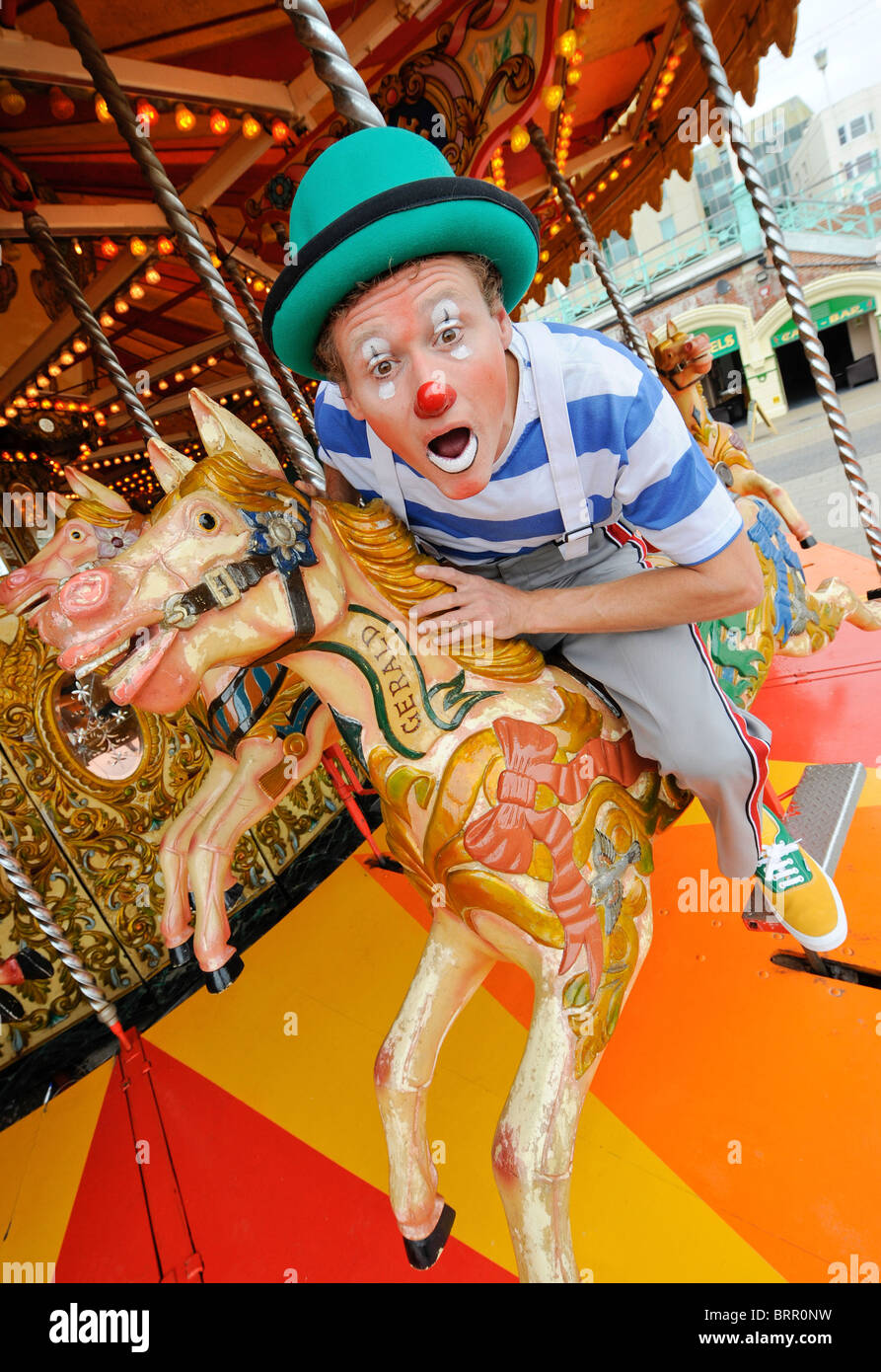 Merry go round clown hi-res stock photography and images - Alamy