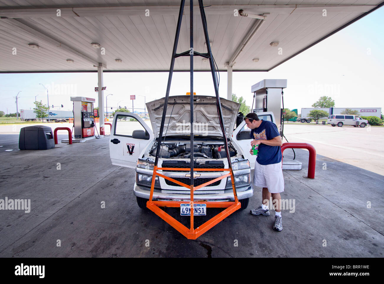 Storm chaser Shawn McQuinn fills up a Project Vortex 2 truck with ...