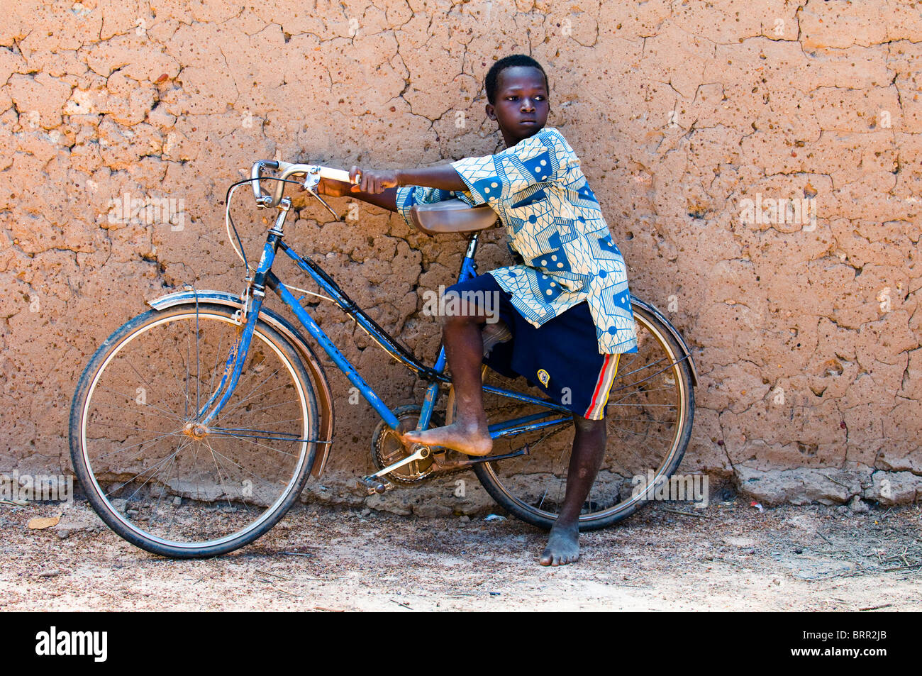 A boy and his cycle Stock Photo - Alamy