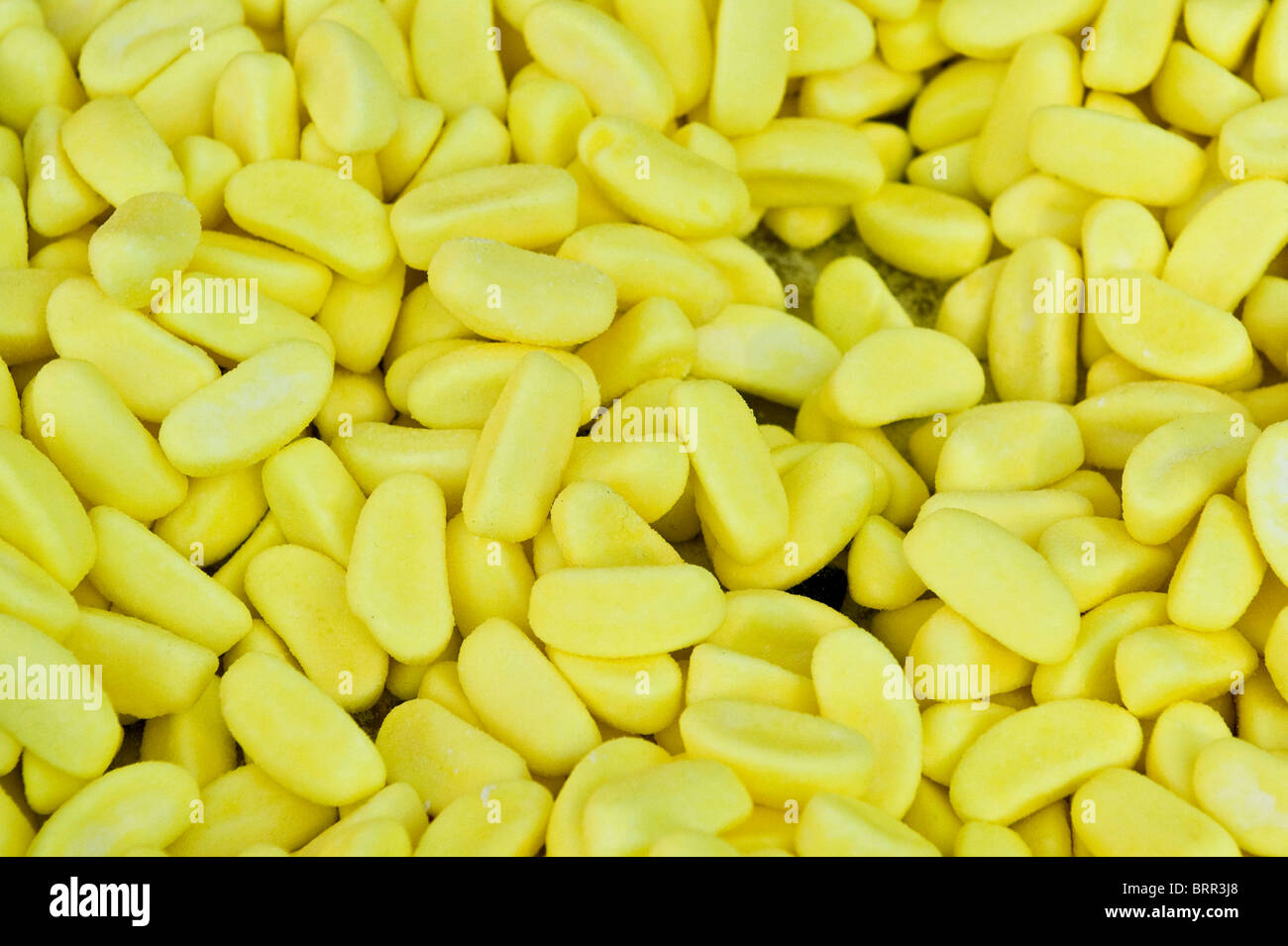 Close-up of yellow candies Stock Photo - Alamy