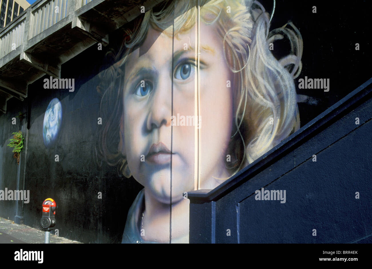 Urban mural of a young girl's face Stock Photo - Alamy