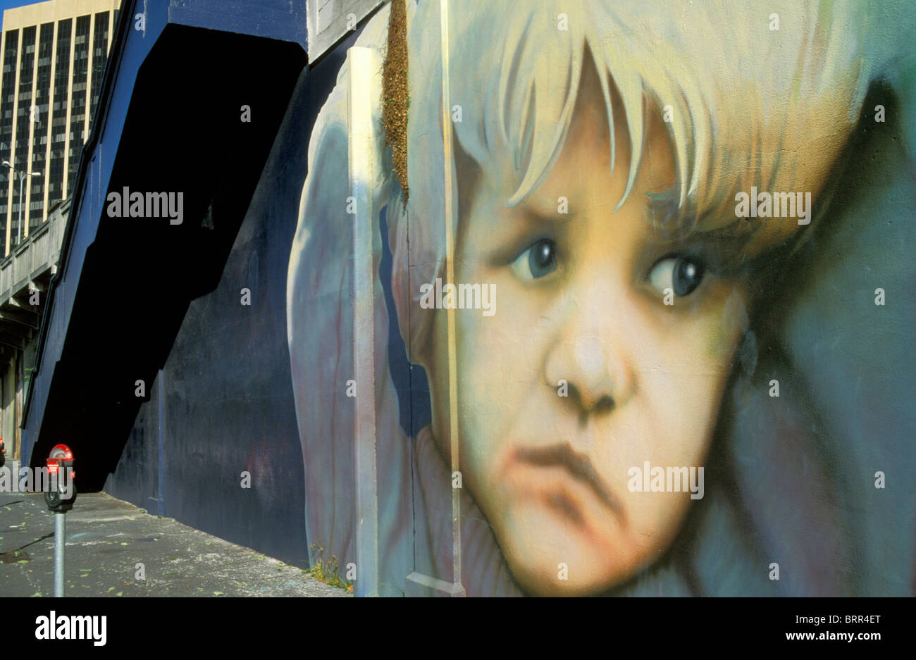 Urban mural of a young girl's face Stock Photo - Alamy