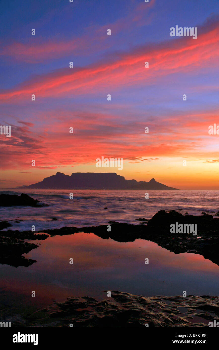 Table Mountain at sunset viewed from Table bay Stock Photo - Alamy