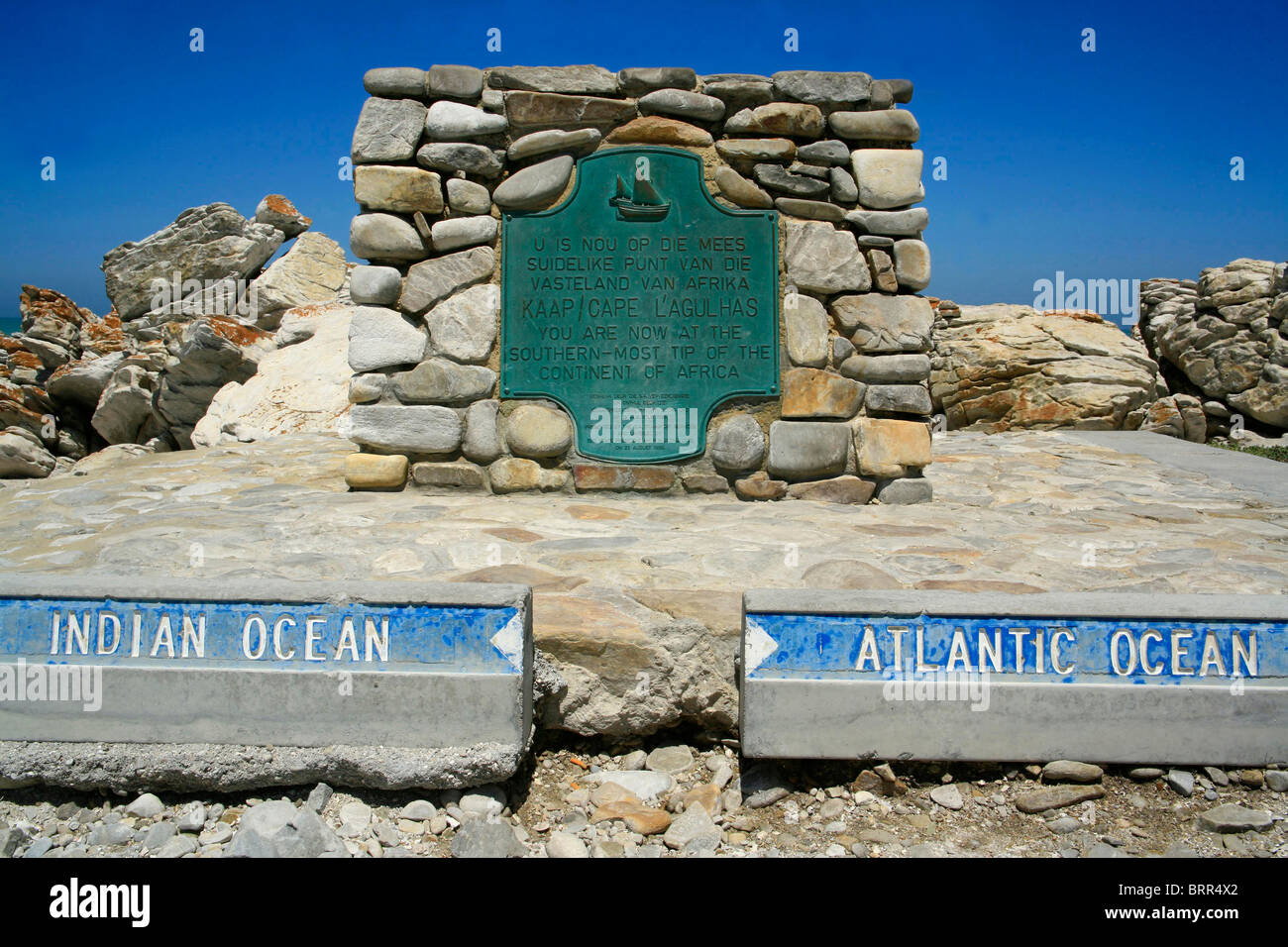 Stone monument at Cape L'Agulhas, the southernmost tip of Africa where ...