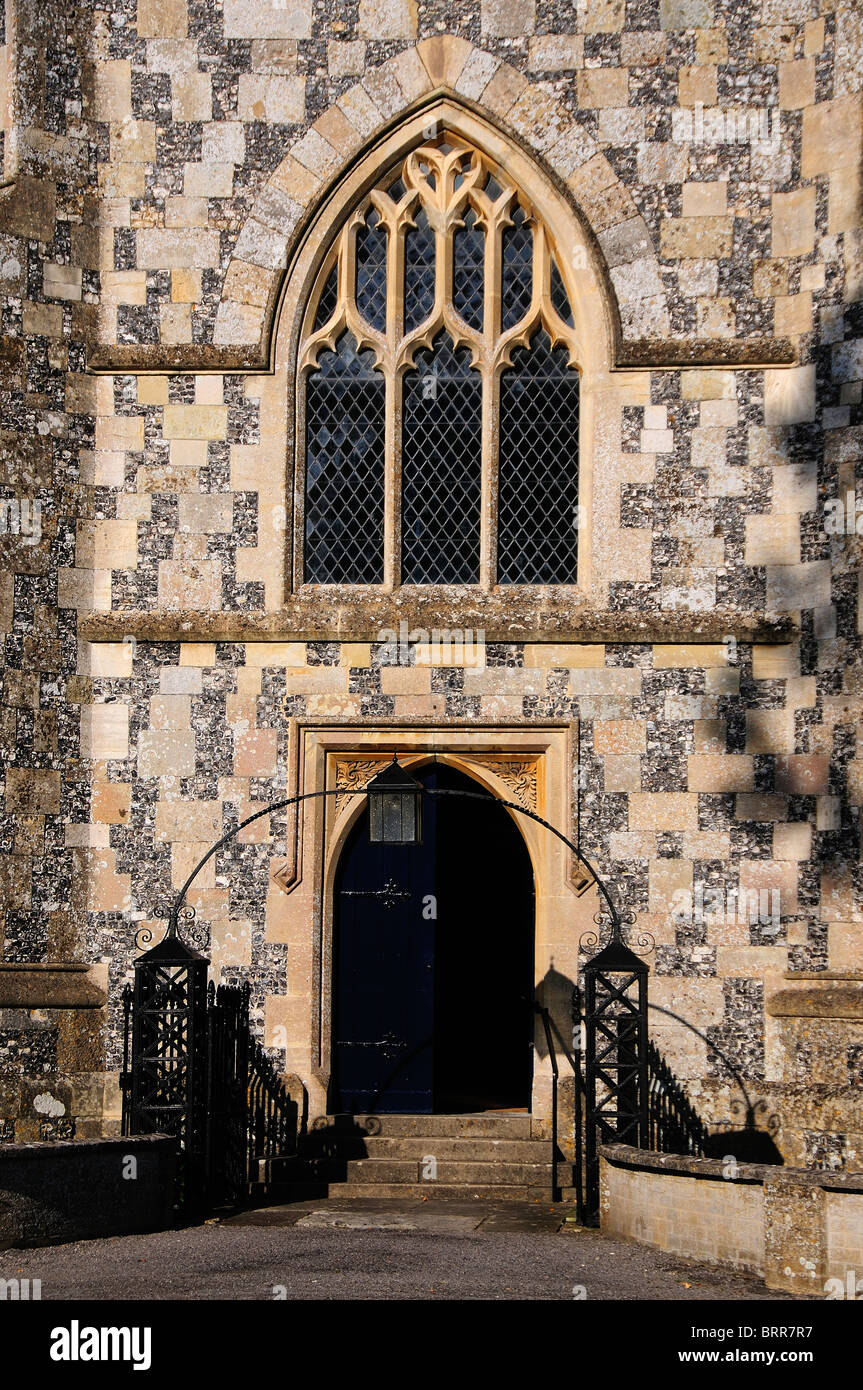 The richly patterned stonework of the church of All Saints and St.Mary ...