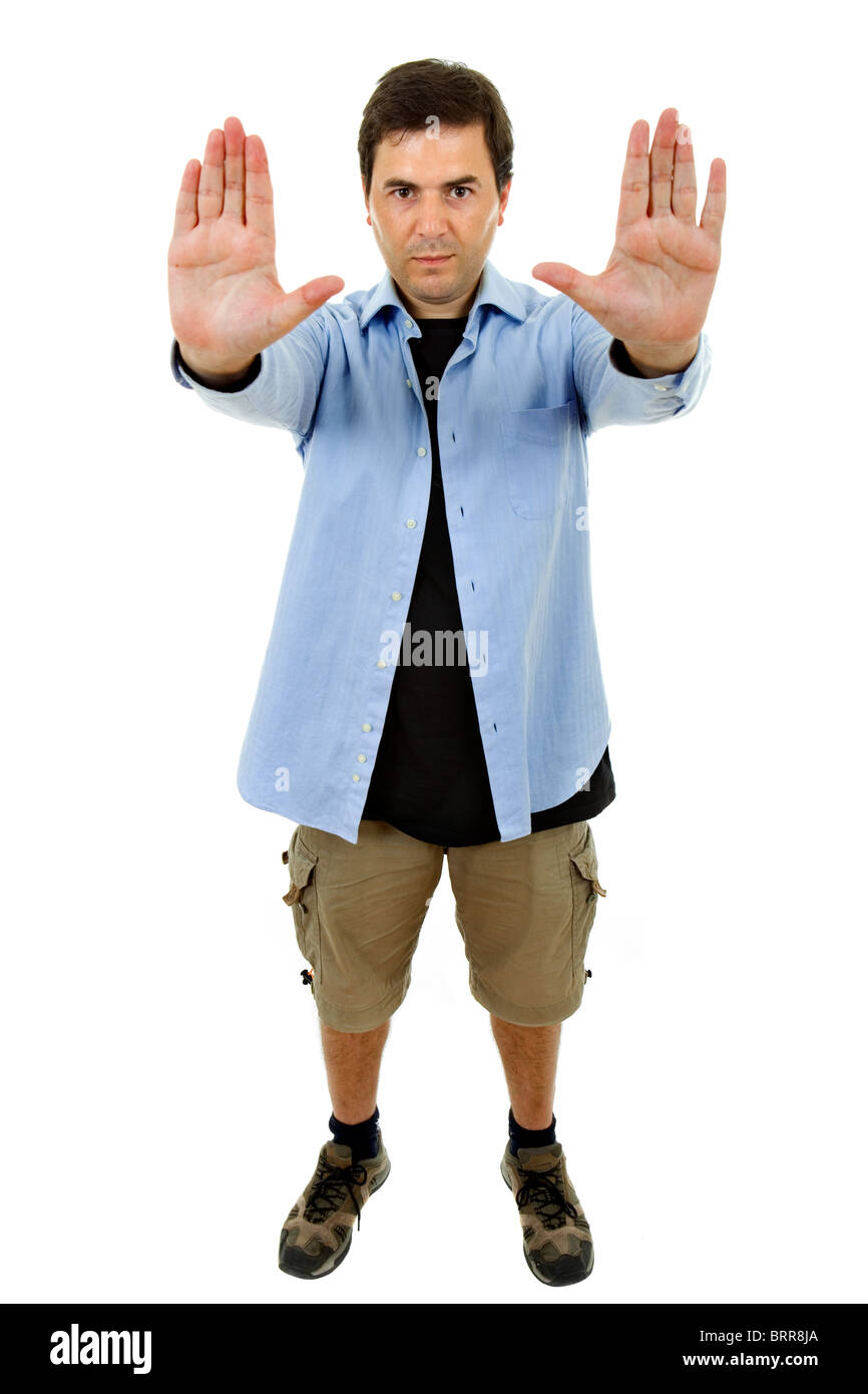 young casual man going stop with his hands, in a white background Stock ...