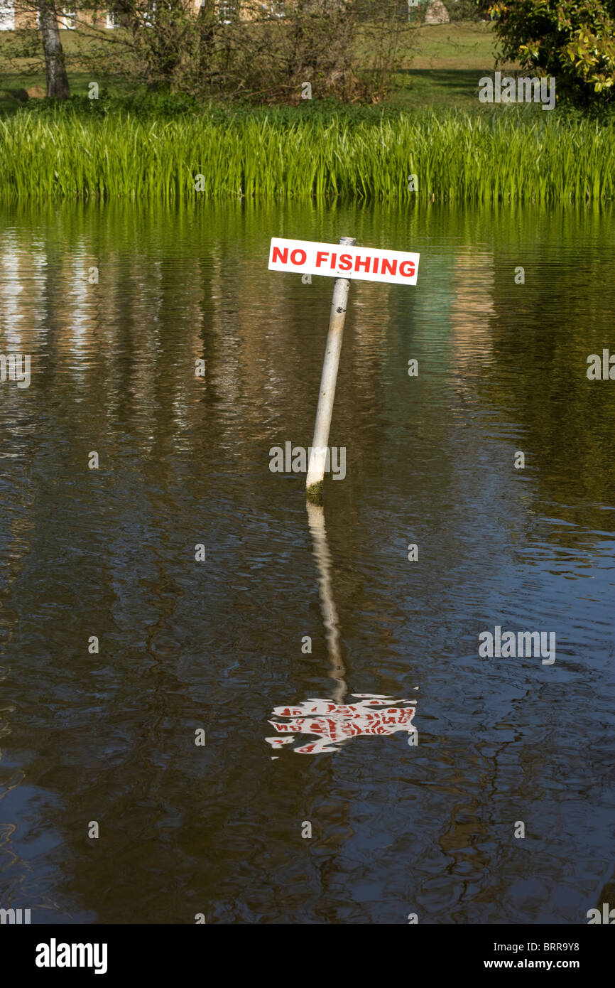 No fishing sign on a river Stock Photo - Alamy