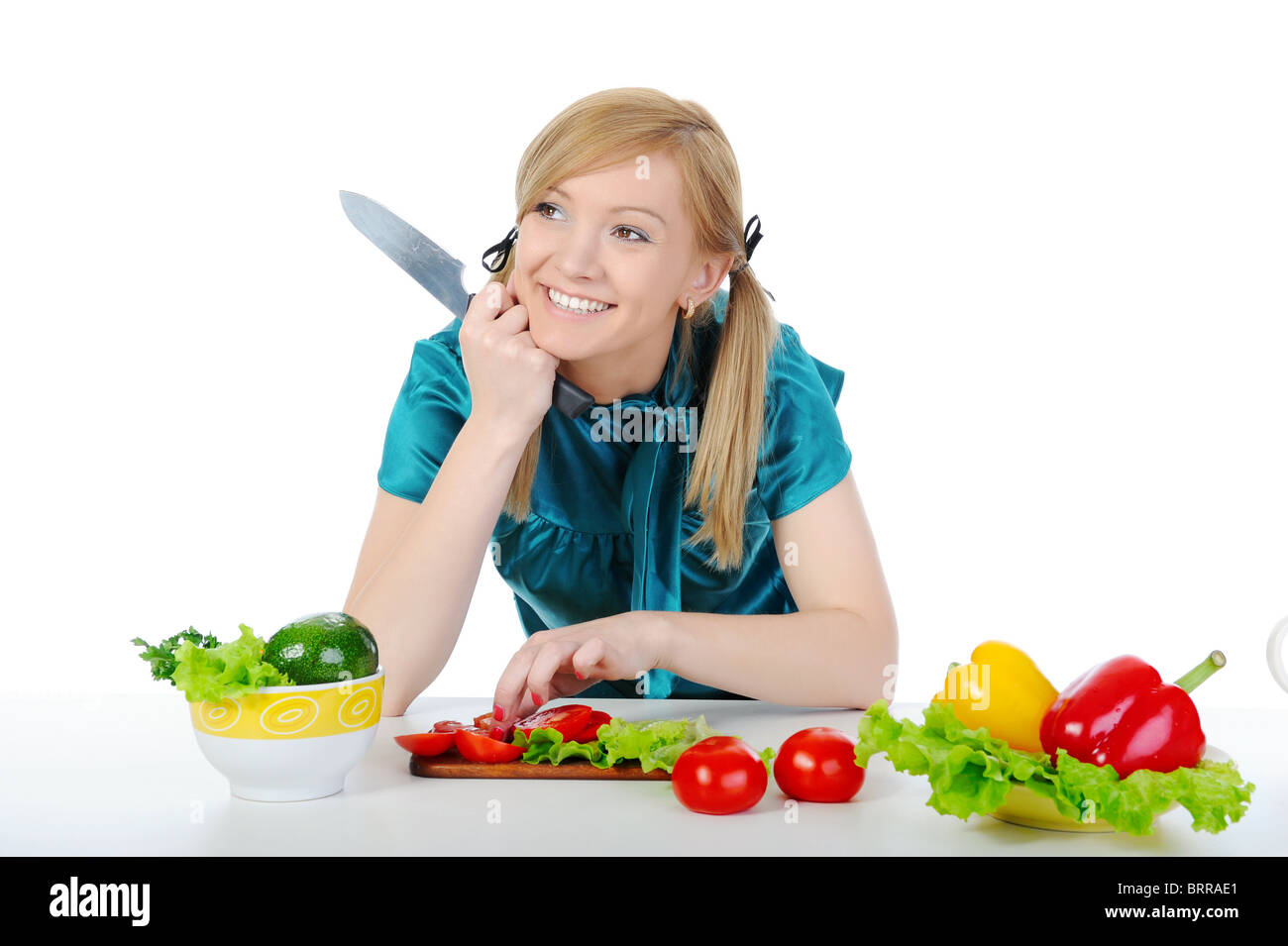 Beautiful smiling girl in the kitchen Stock Photo - Alamy