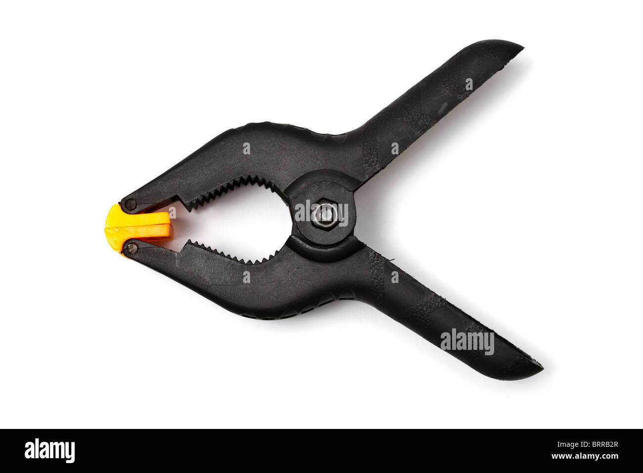 Black spring clamp isolated on white background Stock Photo - Alamy