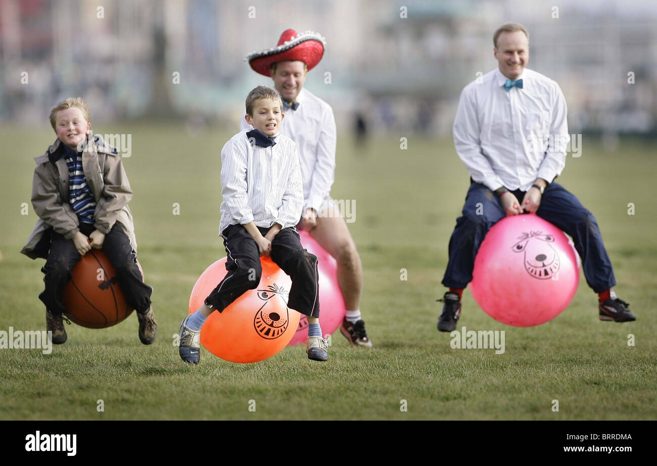 Competitors take part in a Space Hopper race. Picture by James Boardman ...