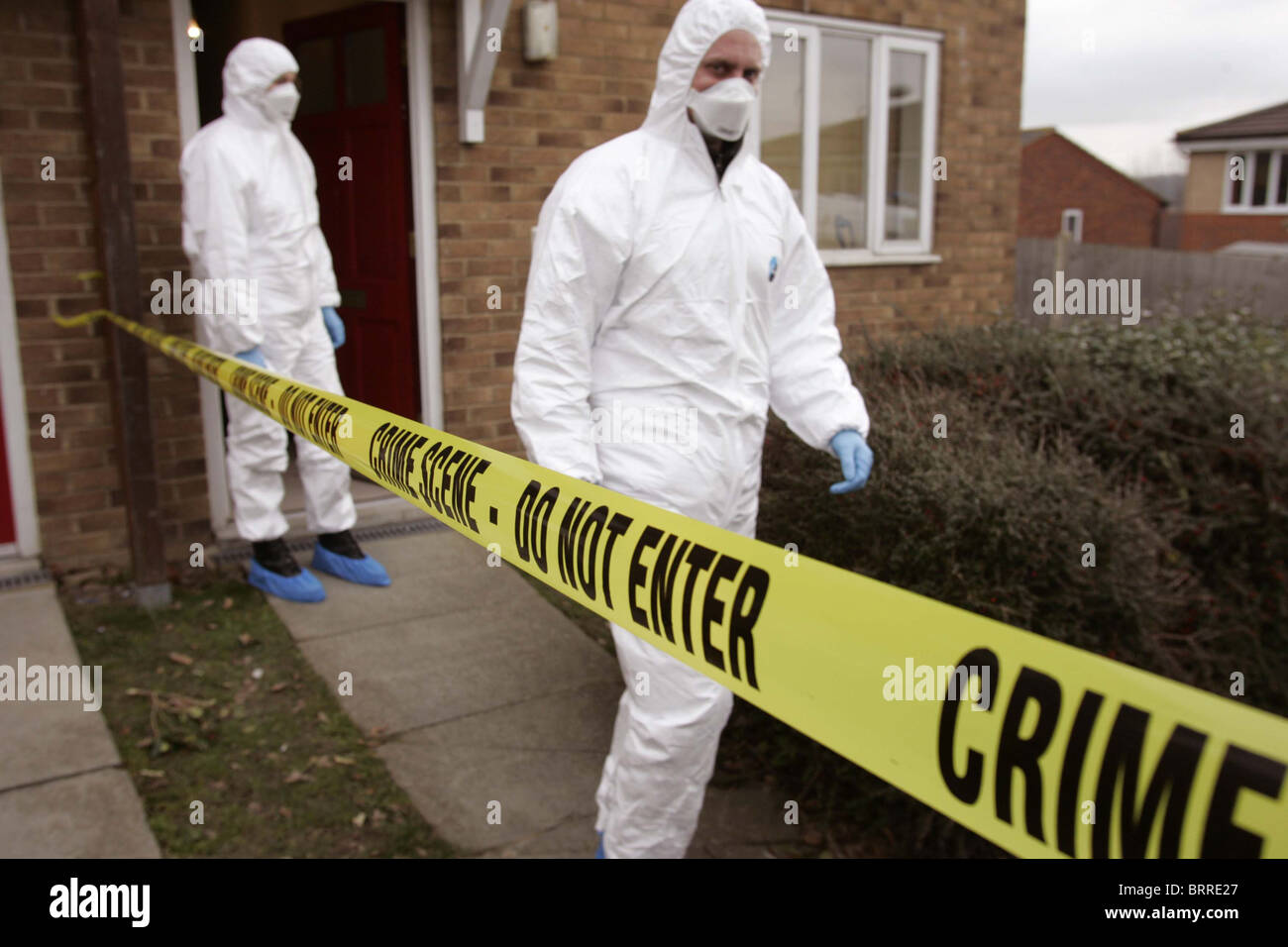 Police scene of crime officers exit a crime scene. Picture by James ...