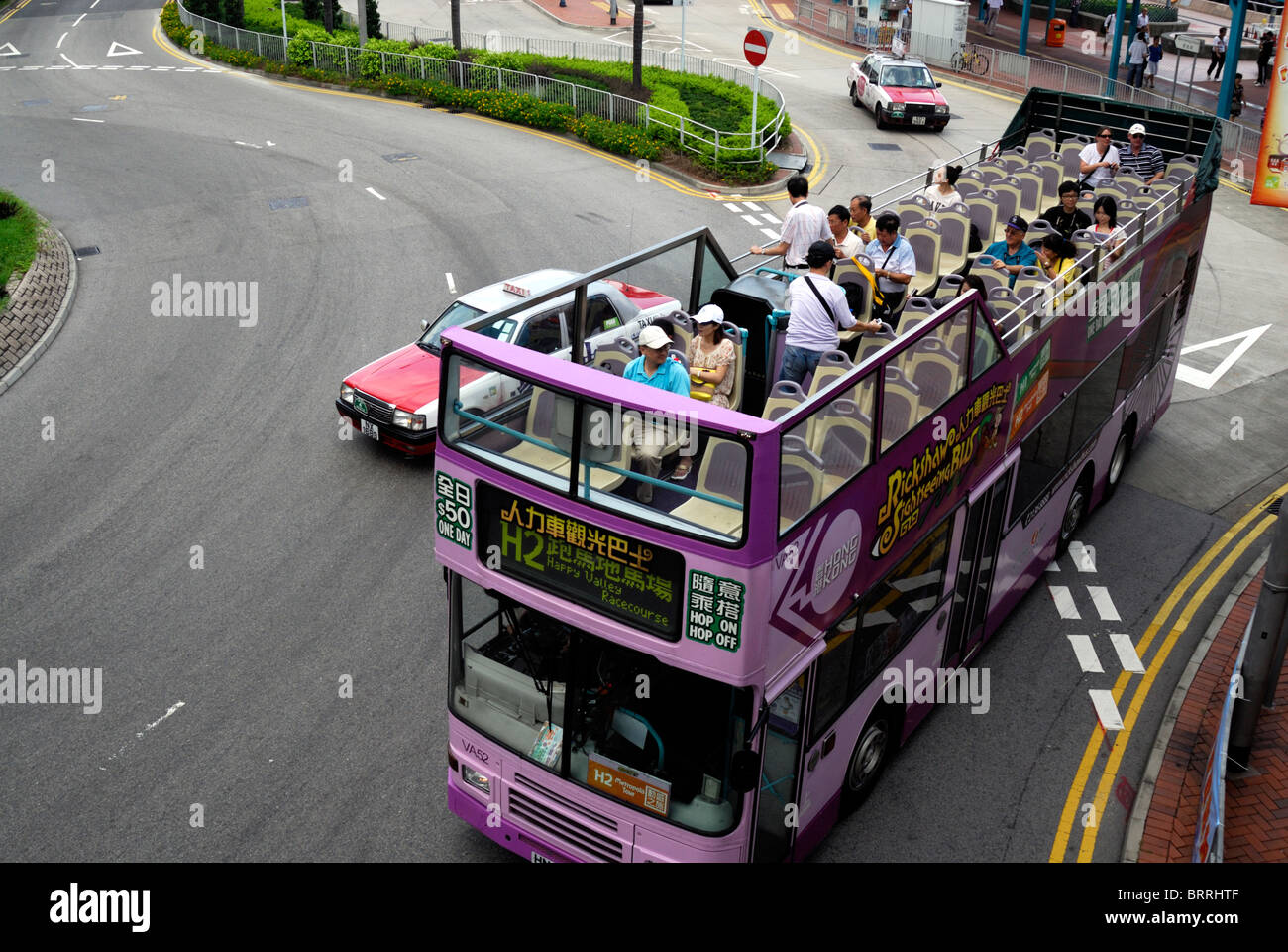 Tour bus on Hong Kong Island called the Rickshaw Bus Stock Photo - Alamy