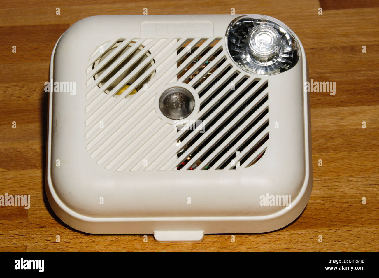 A smoke alarm incorporating an emergency light Stock Photo - Alamy