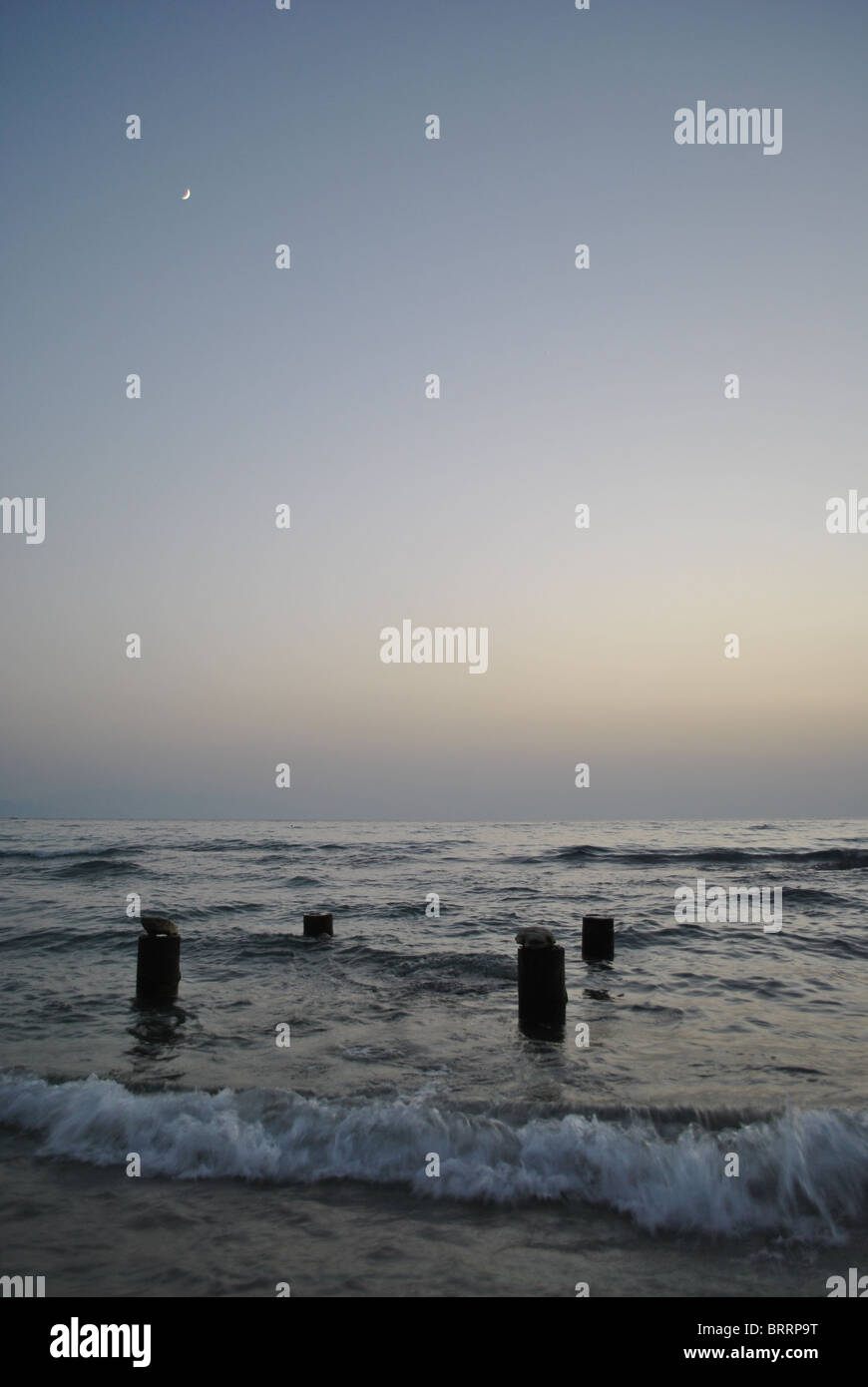 Crescent moon over sea hi-res stock photography and images - Alamy