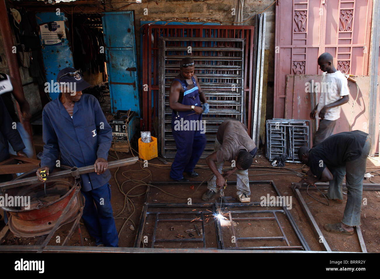 men welding in metal workshop Freetown Sierra Leone West Africa Stock ...