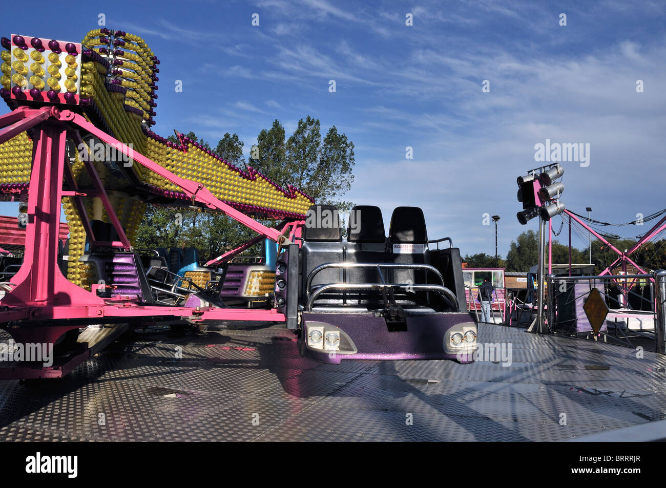 A three seater Energy Rush fairground ride carriage labelled to show ...