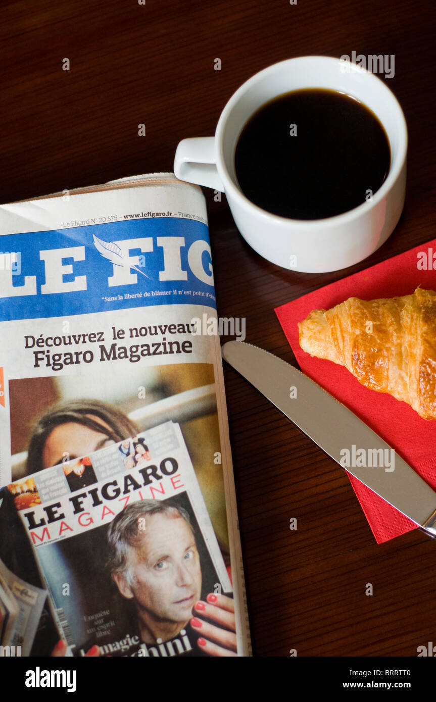 A typically French scene: an edition of Le Figaro newspaper, a cup of ...