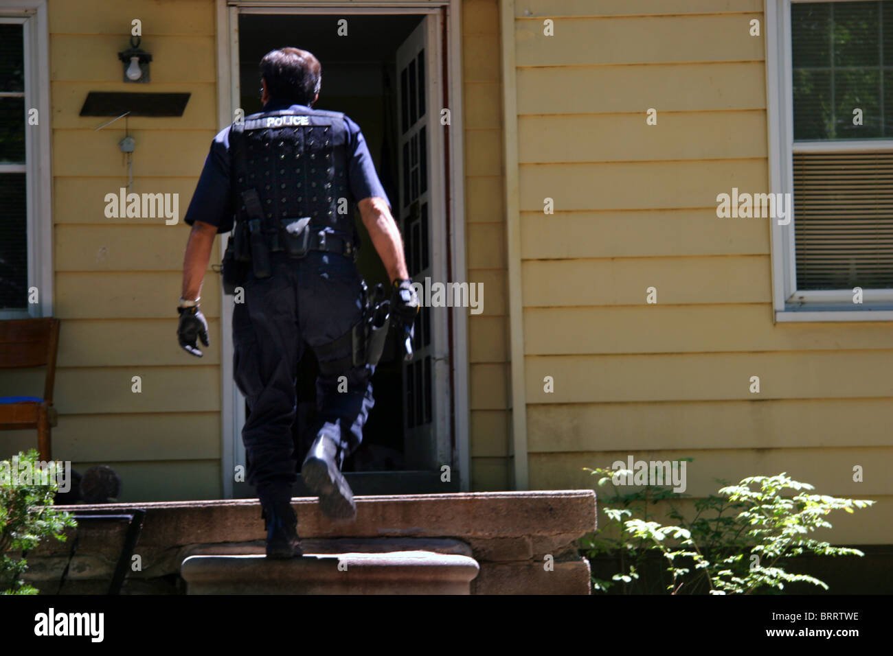 Raiding cop hi-res stock photography and images - Alamy