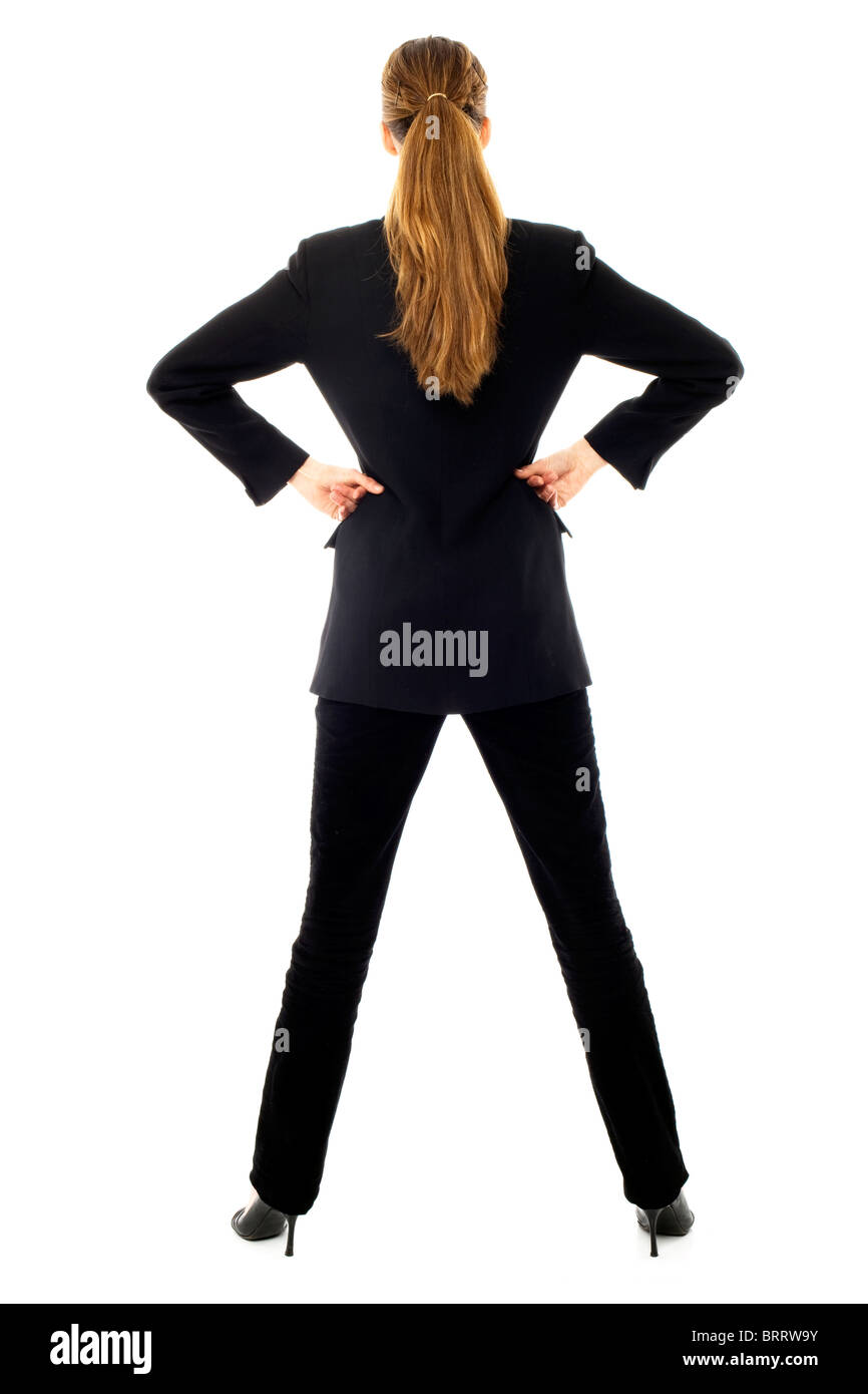 Young businesswoman standing back Stock Photo - Alamy