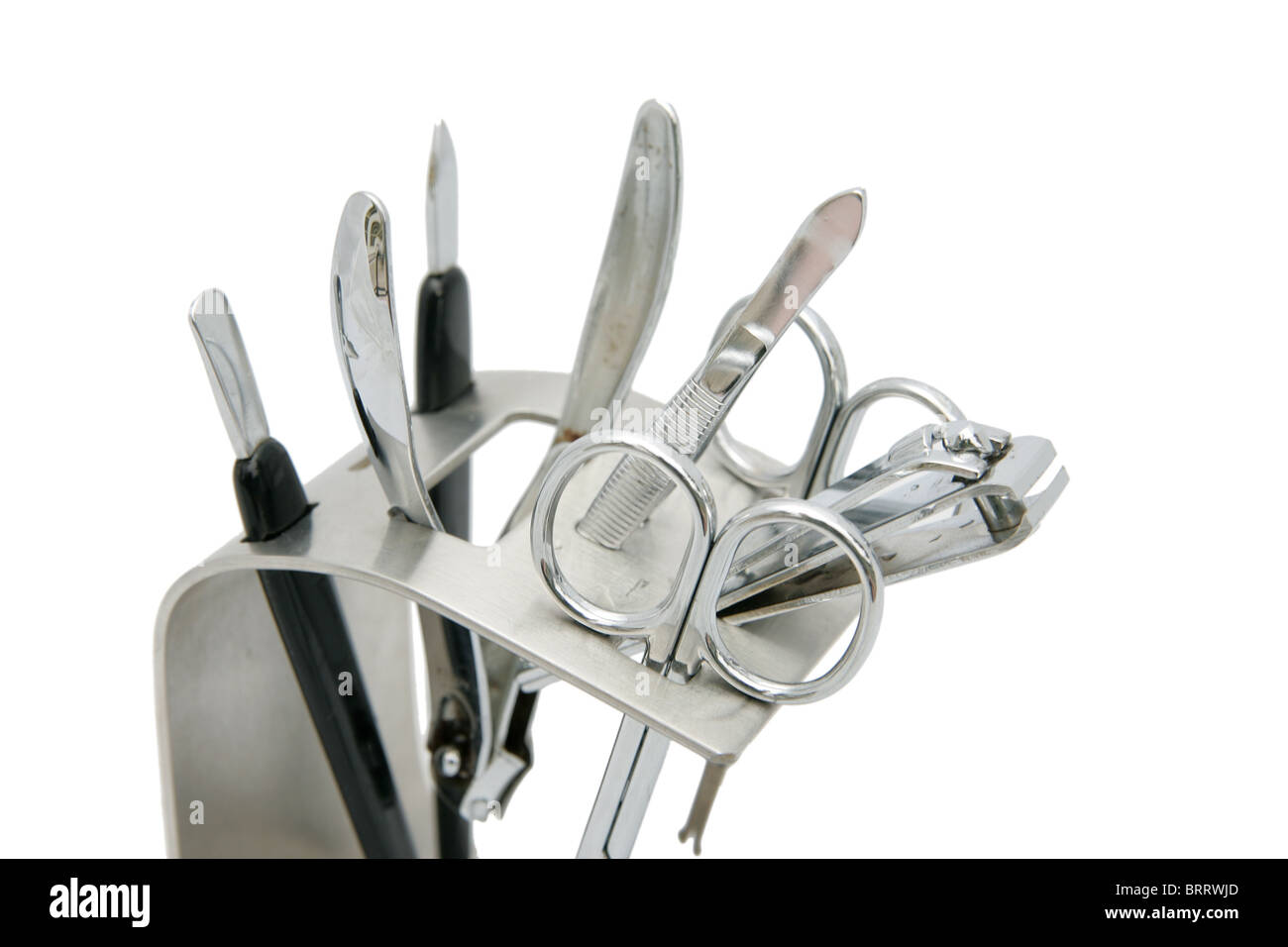 closeup of a silver personal hygiene kit for a bathroom with scissors ...