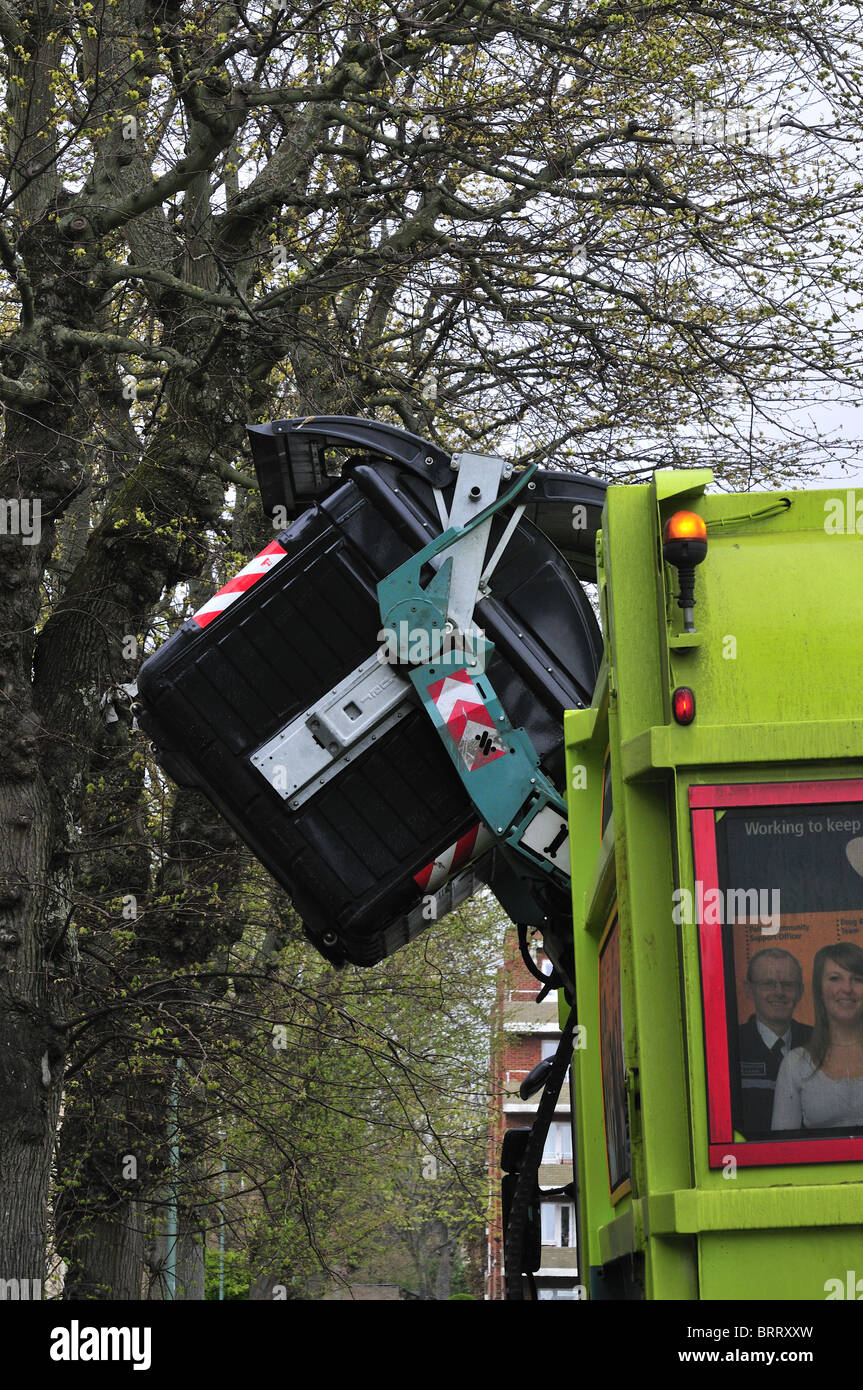 community refuse bins garbage truck collection Stock Photo - Alamy