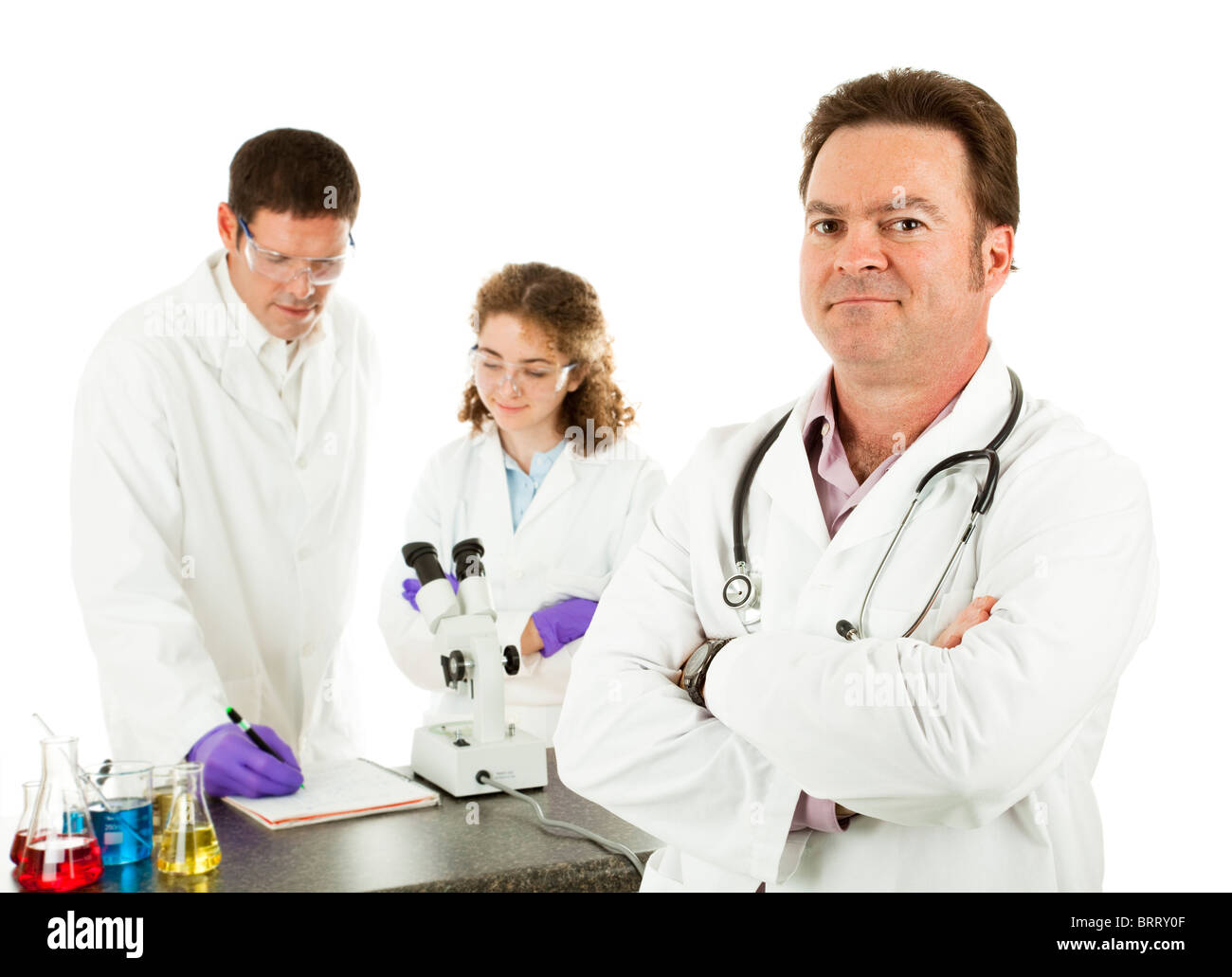 Handsome medical doctor in the laboratory. Scientists working in the ...