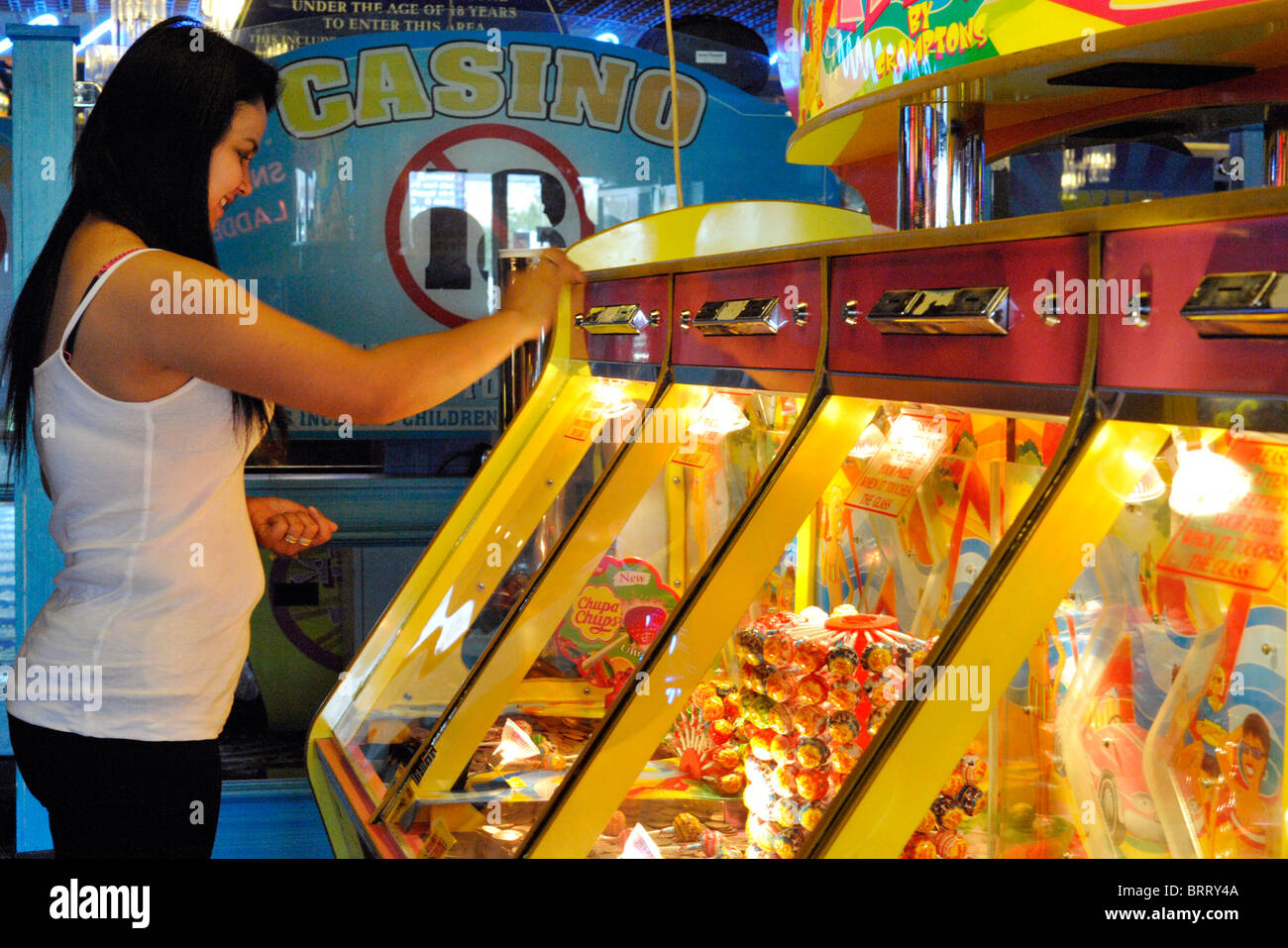 Woman gambling machine hi-res stock photography and images - Alamy