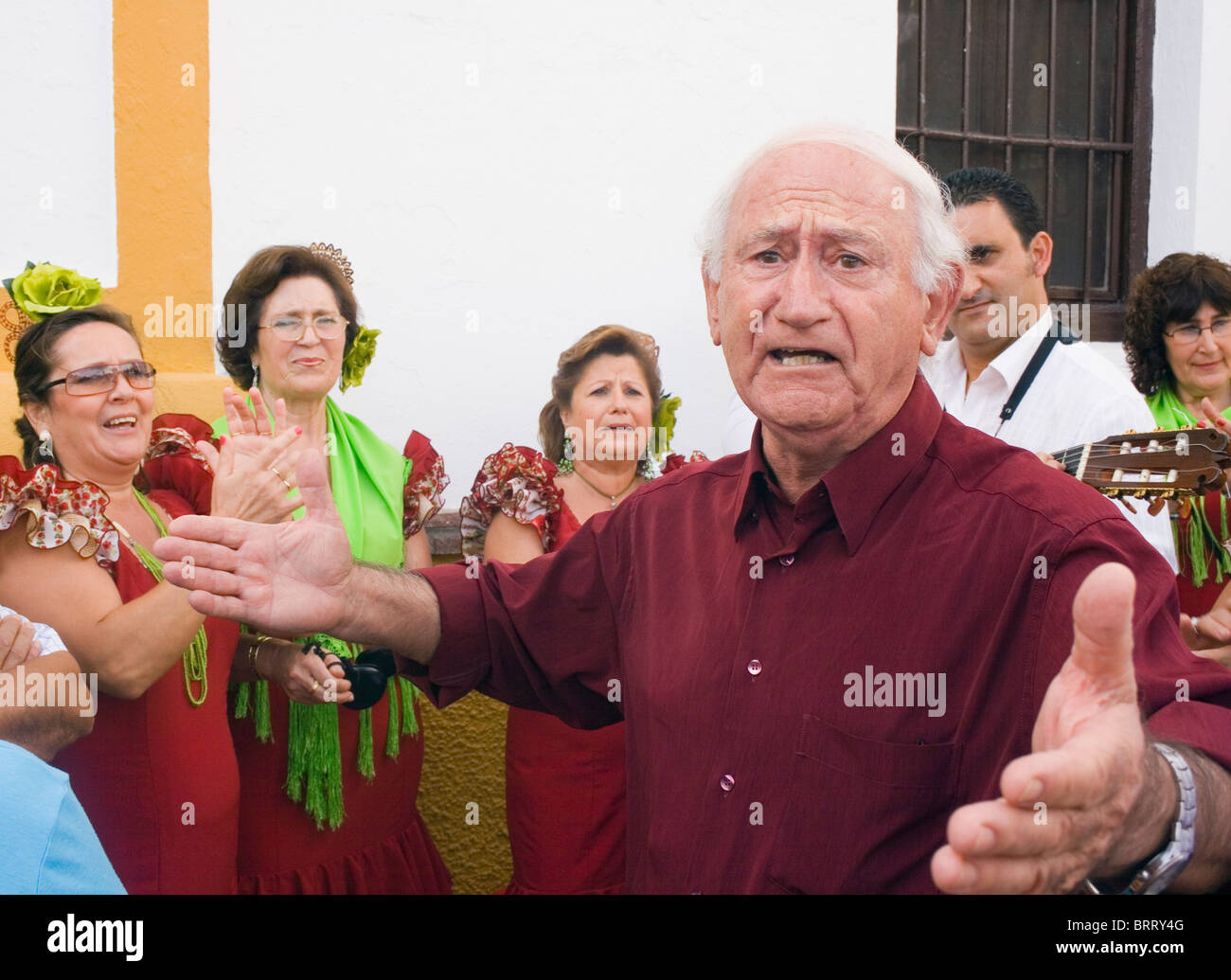 Spanish man and Rocio choir singing at the Festival of the Almond ...