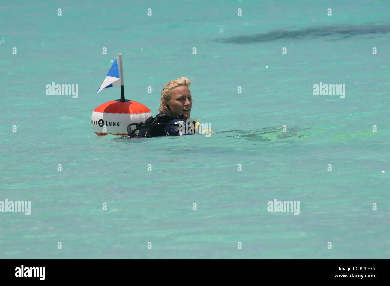 Female Diver On The Surface After A Dive In The Maldives Stock Photo ...