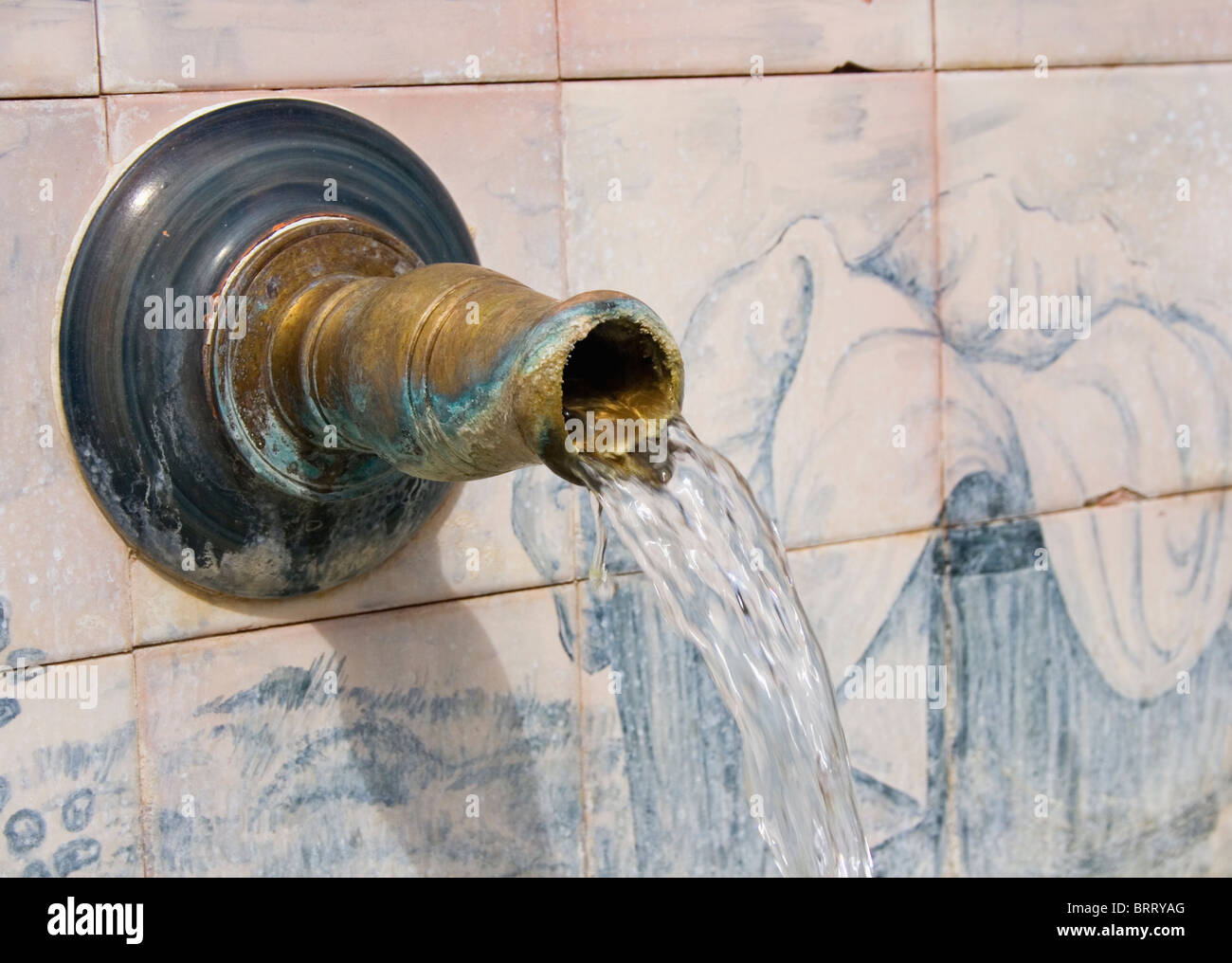 Water pouring out of fountain Stock Photo - Alamy