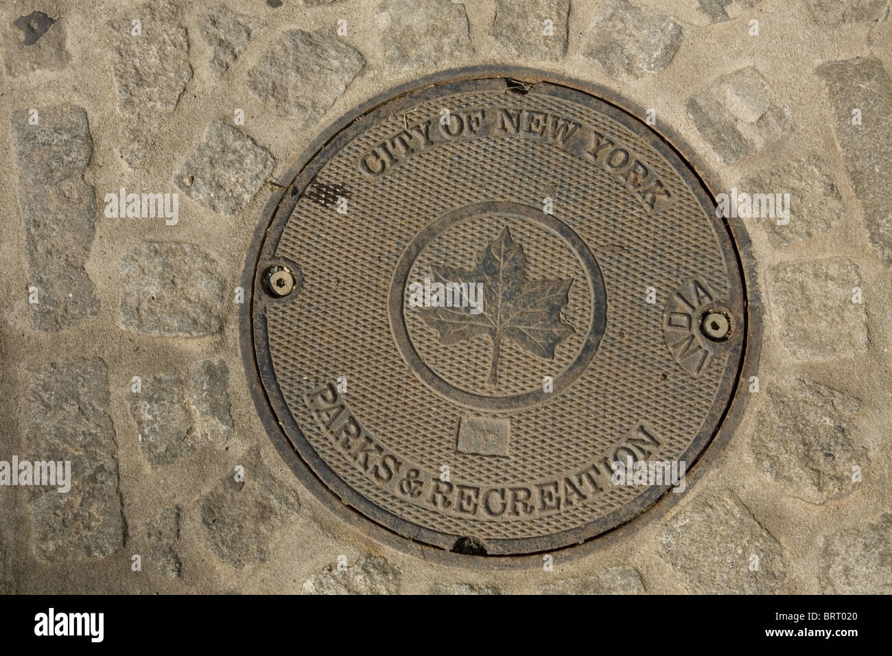 Manhole cover nyc street hi-res stock photography and images - Alamy