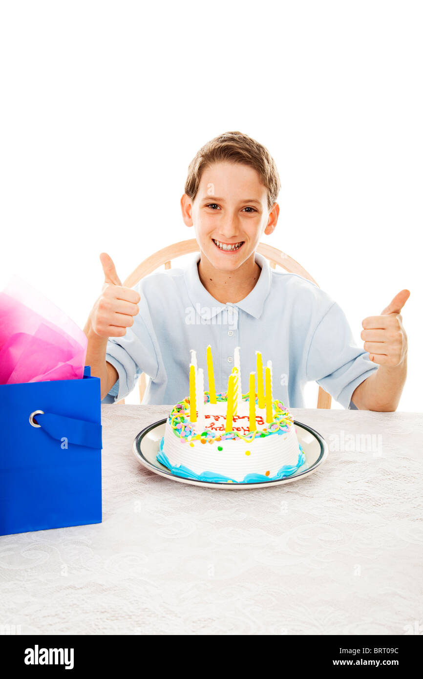 Cute little boy giving a thumbs up at his birthday party. White ...