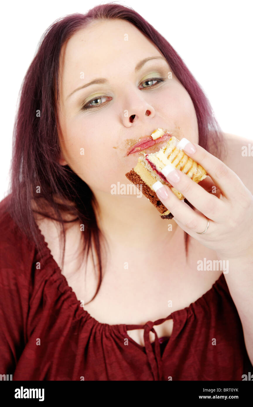 Fat woman eating slice cake hi-res stock photography and images - Alamy