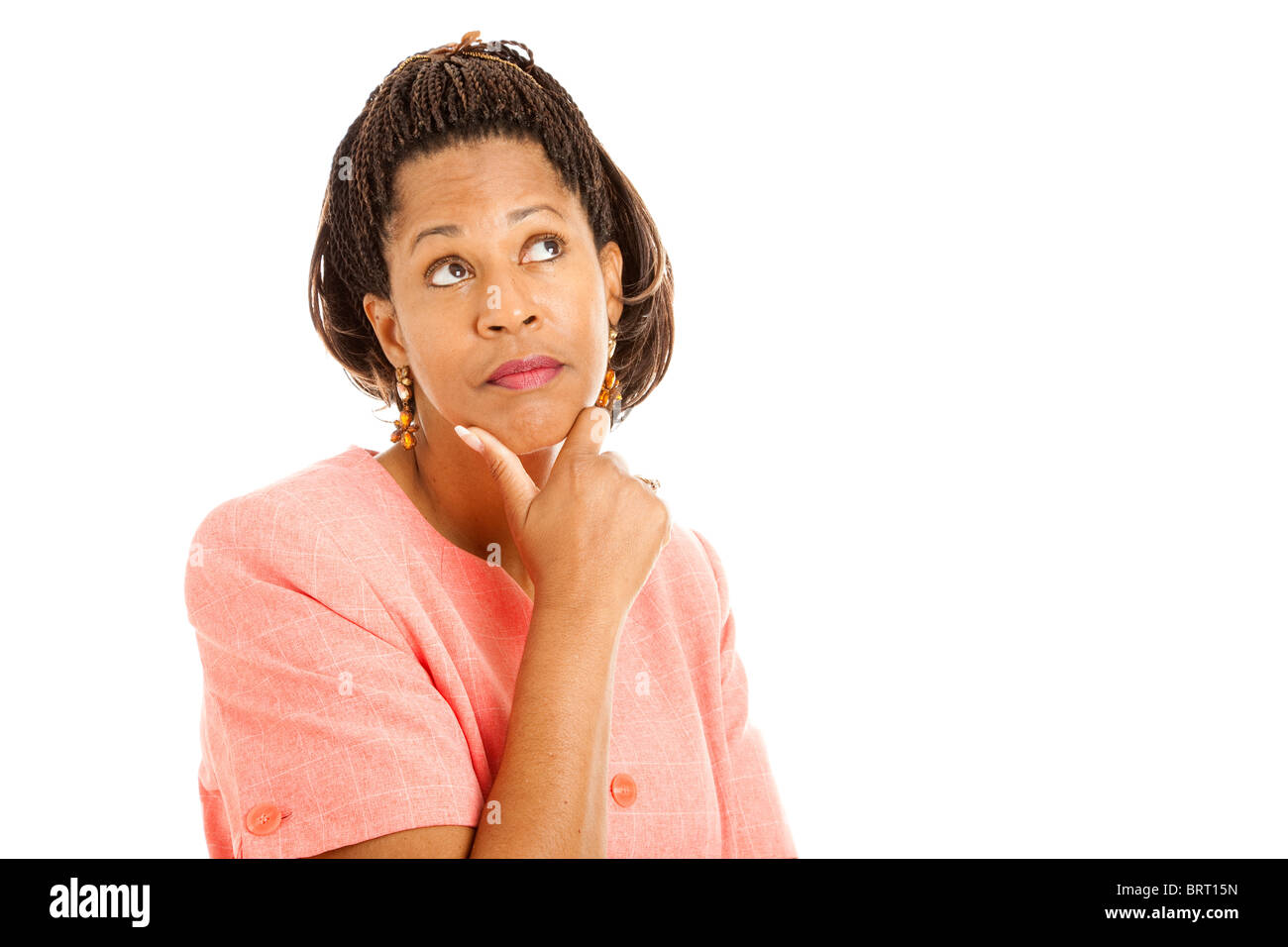 Beautiful African-American woman thinking. Isolated on white Stock ...