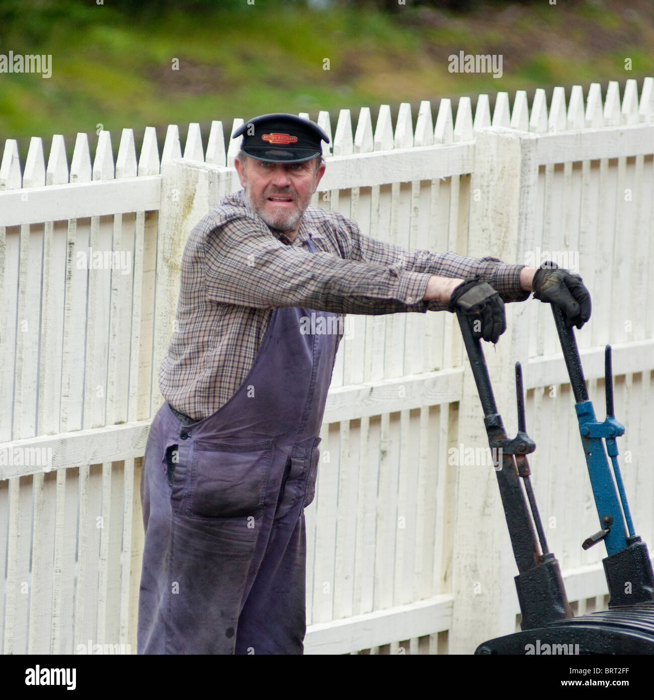 Signalman pulling levers for the historic steam train Number 828 at ...