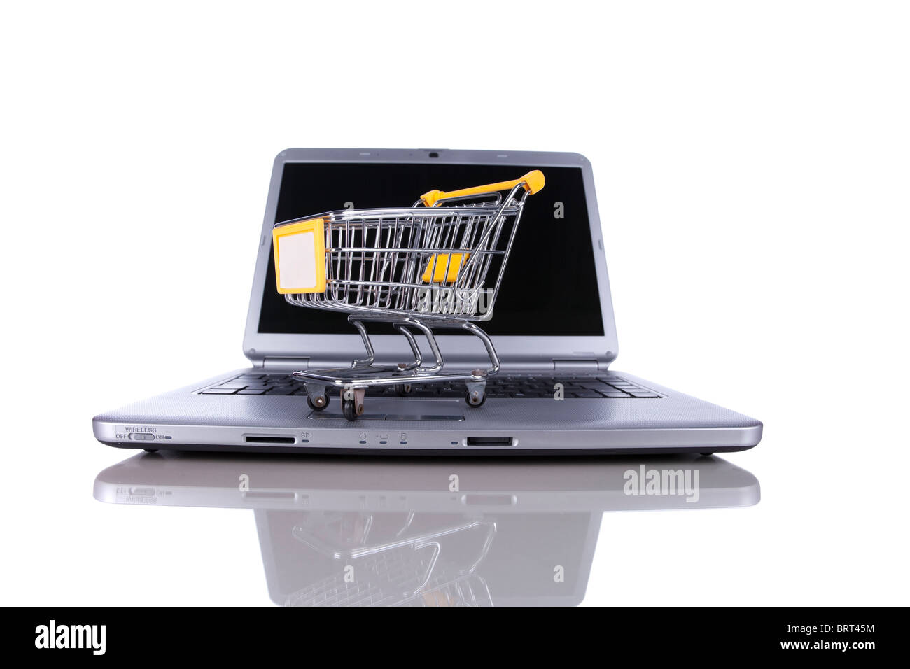 shopping-cart over a laptop isolated on white with reflection Stock ...
