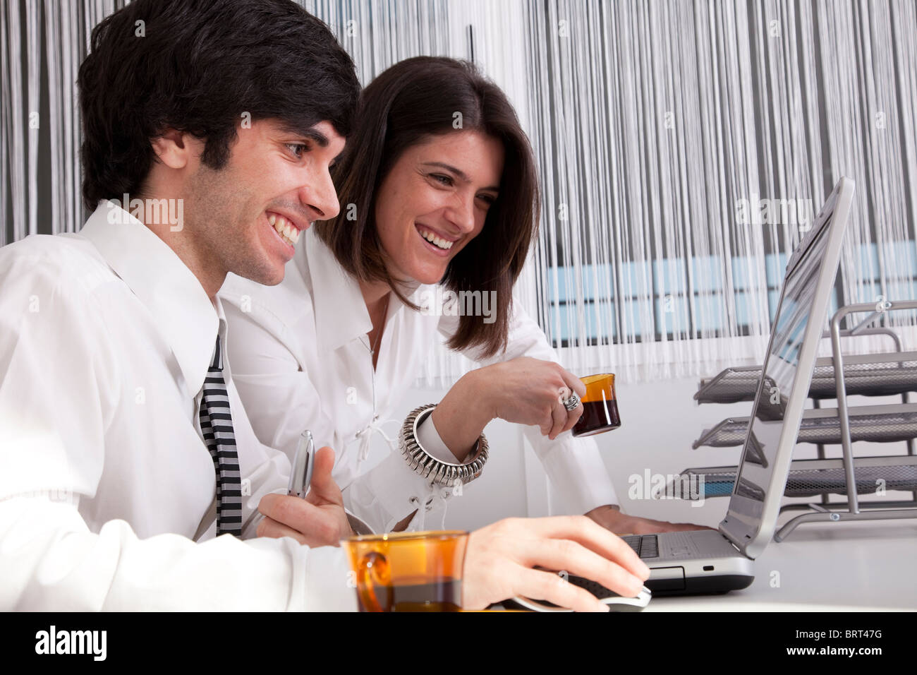 Modern team working at the office Stock Photo - Alamy