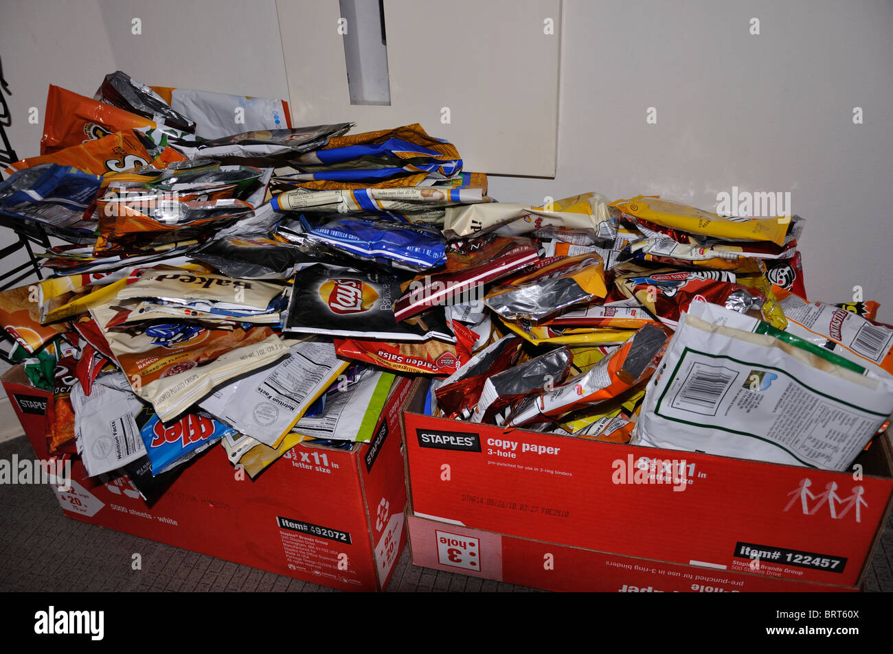 Pile of empty bags from chips and snacks prepared to be recycled Stock ...