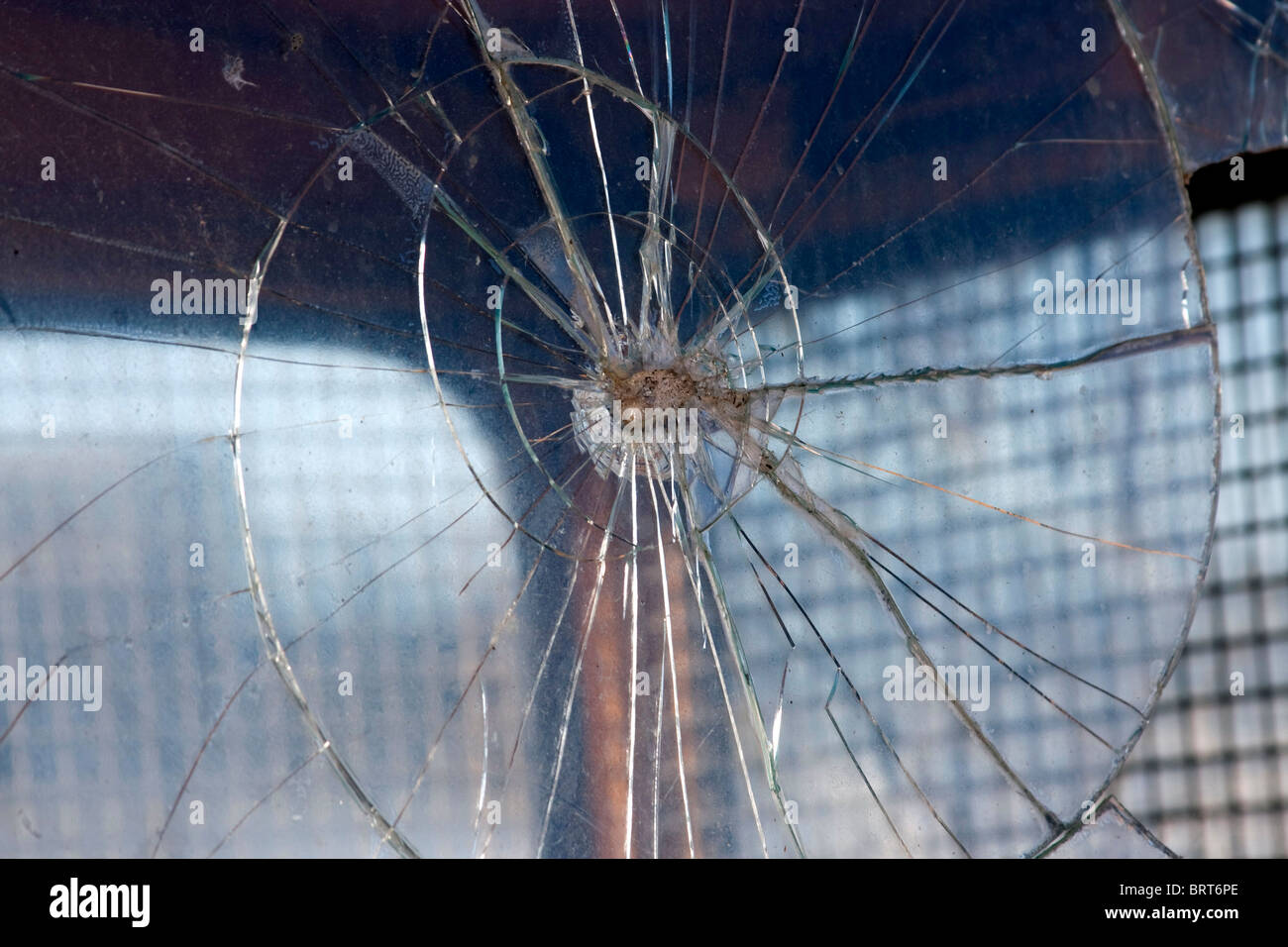 Broken glass window Stock Photo - Alamy