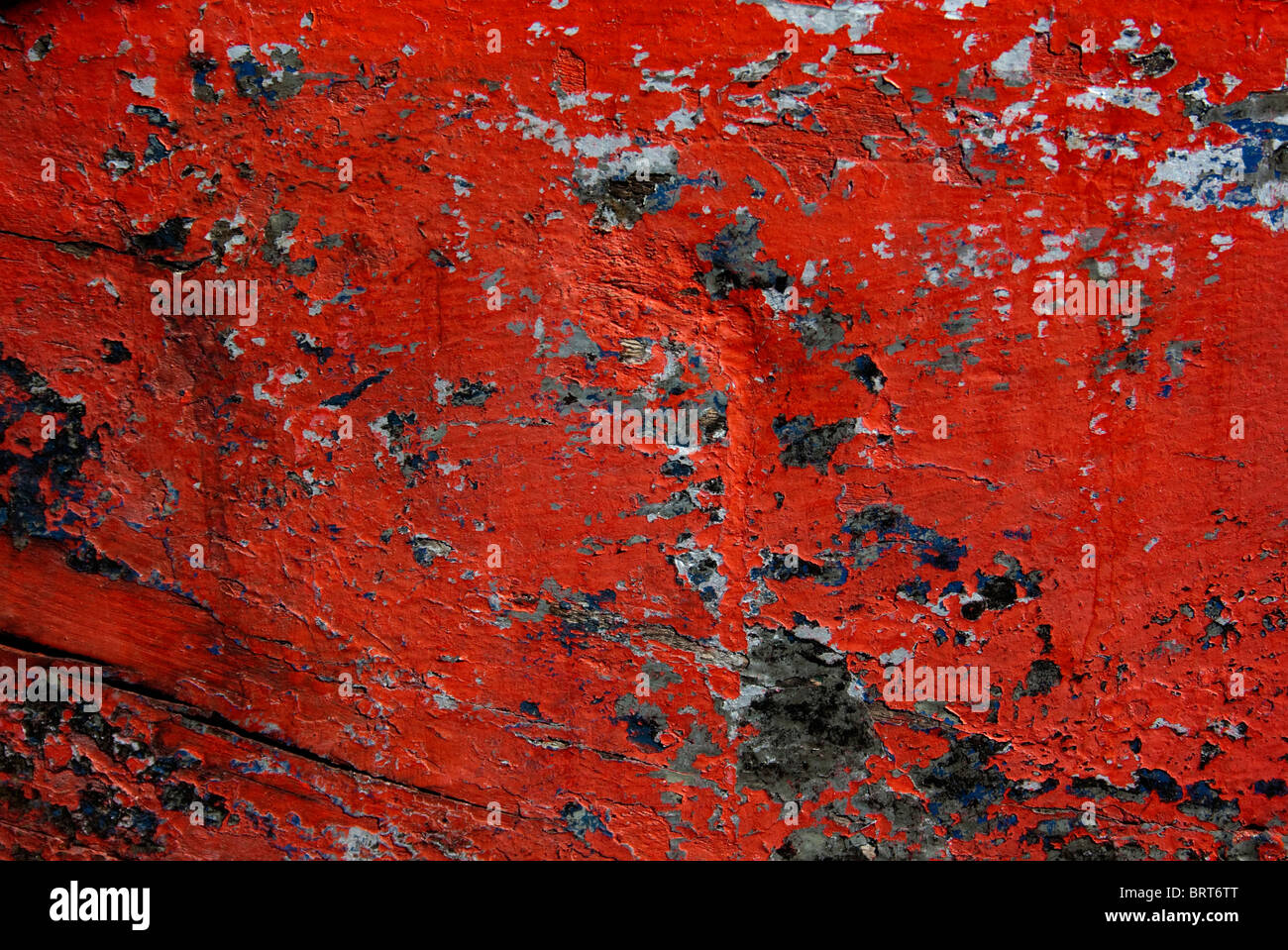 Peeling red paint Stock Photo - Alamy