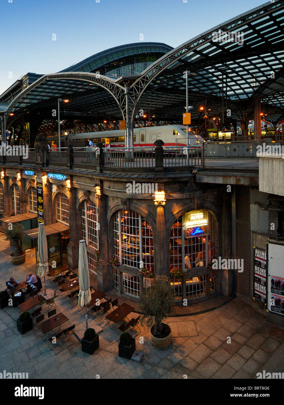 Cologne central train station hauptbahnhof with ICE train and cafe ...